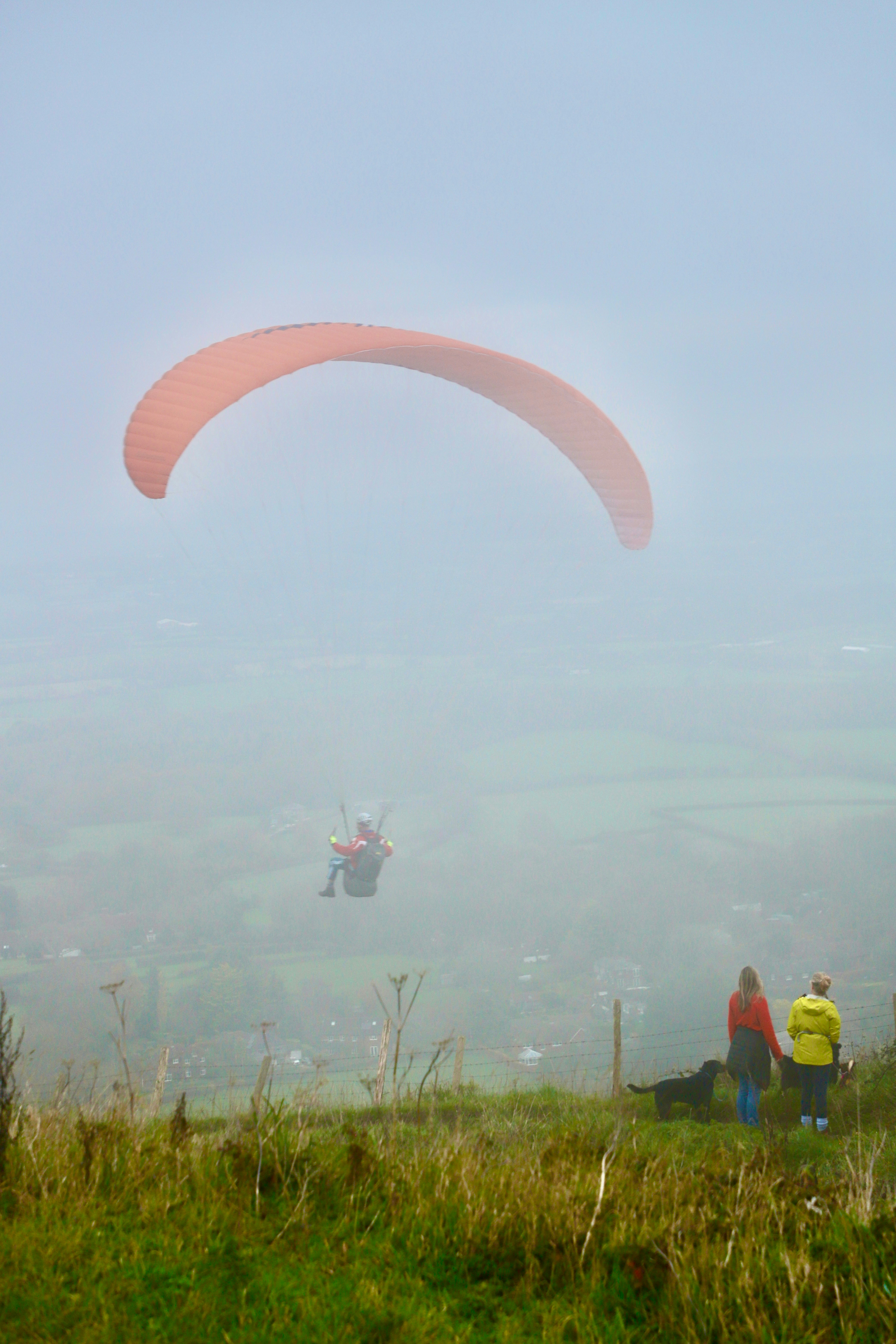 Crimson Arc Over the Misty Ridge