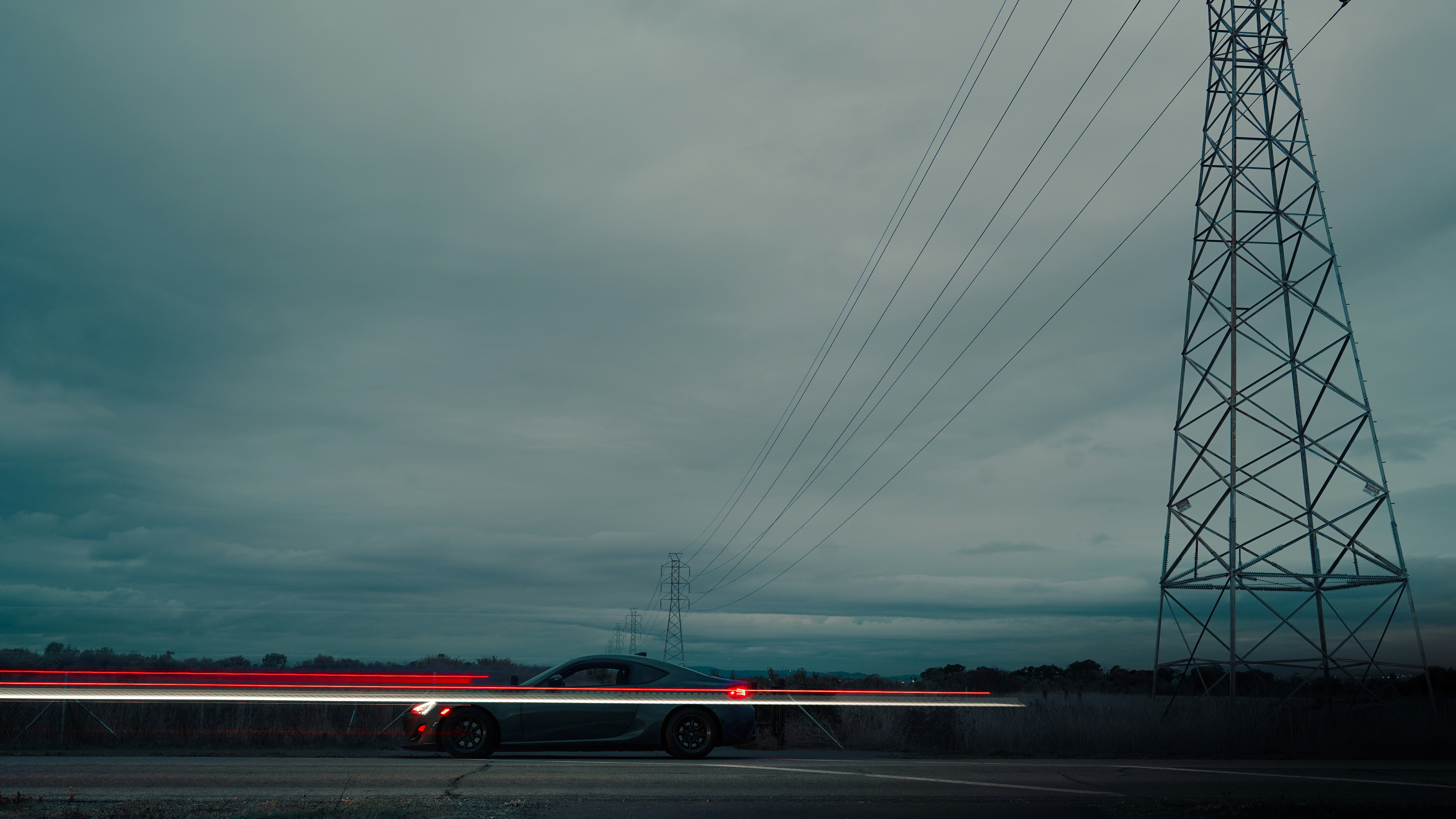 Car driving on highway with power lines overhead photo – Free Car Image ...