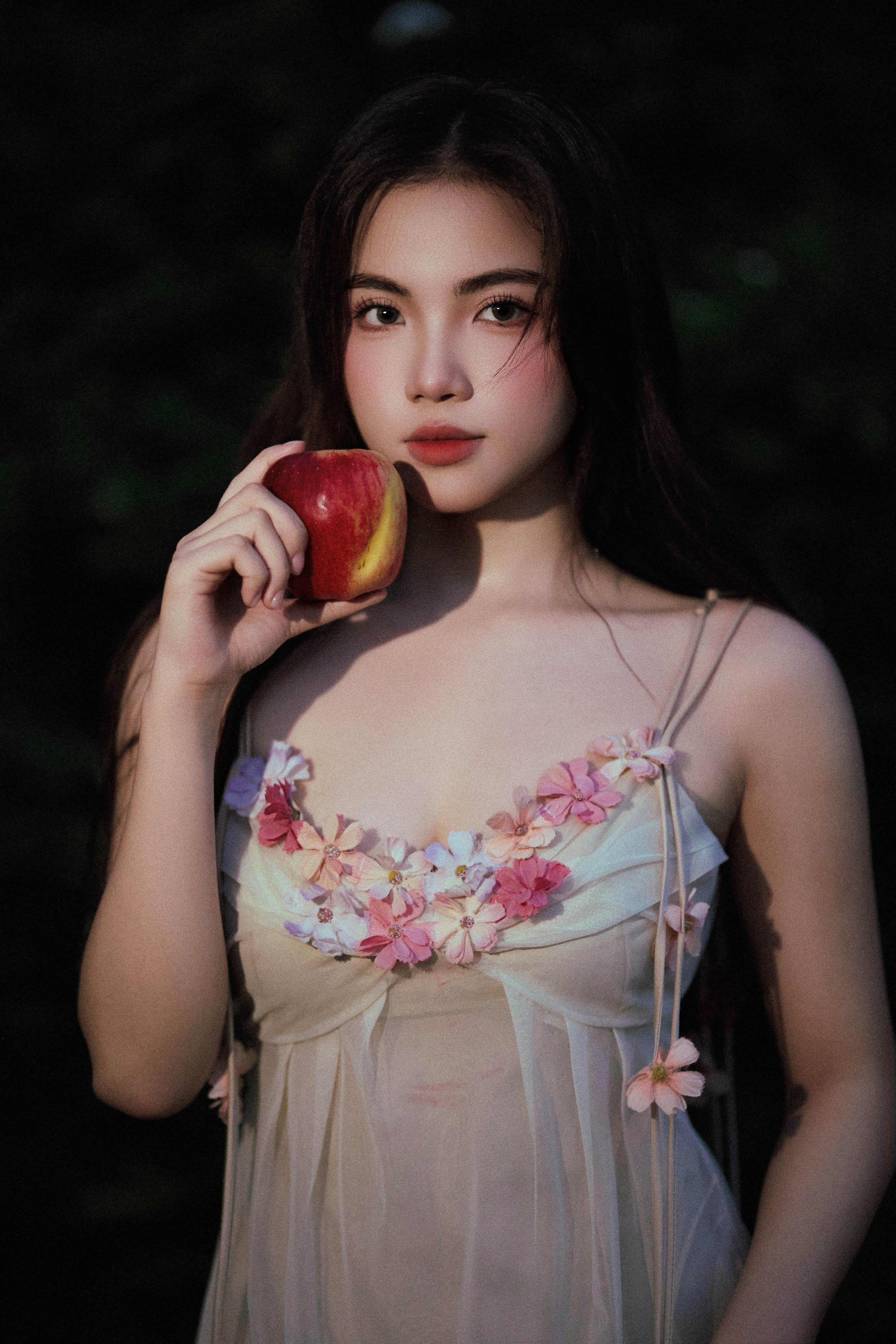Apple in Bloom: A Quiet Portrait in Velvet Light