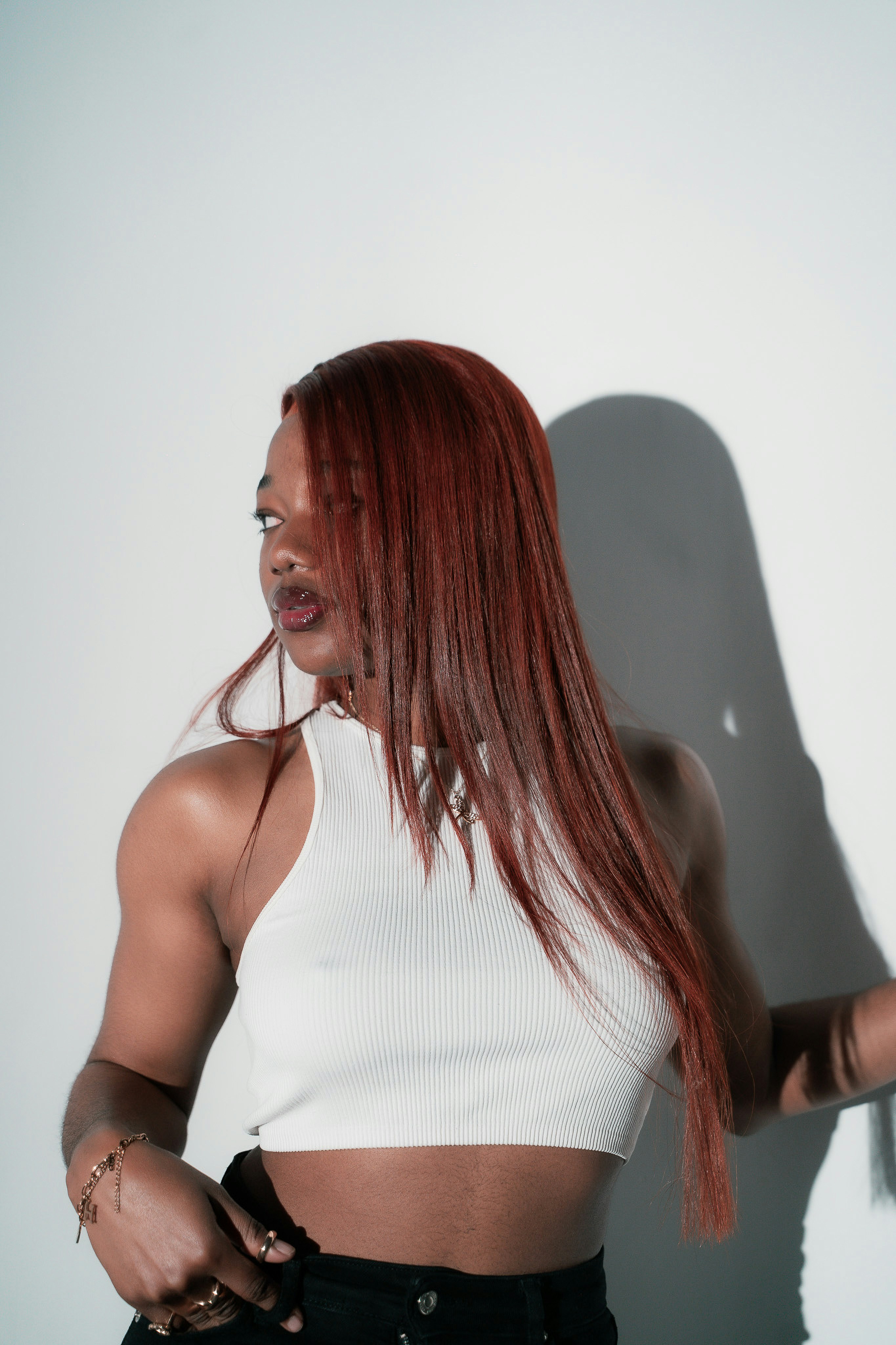 Crimson Silk Portrait: Studio Light, Shadow, and Quiet Confidence