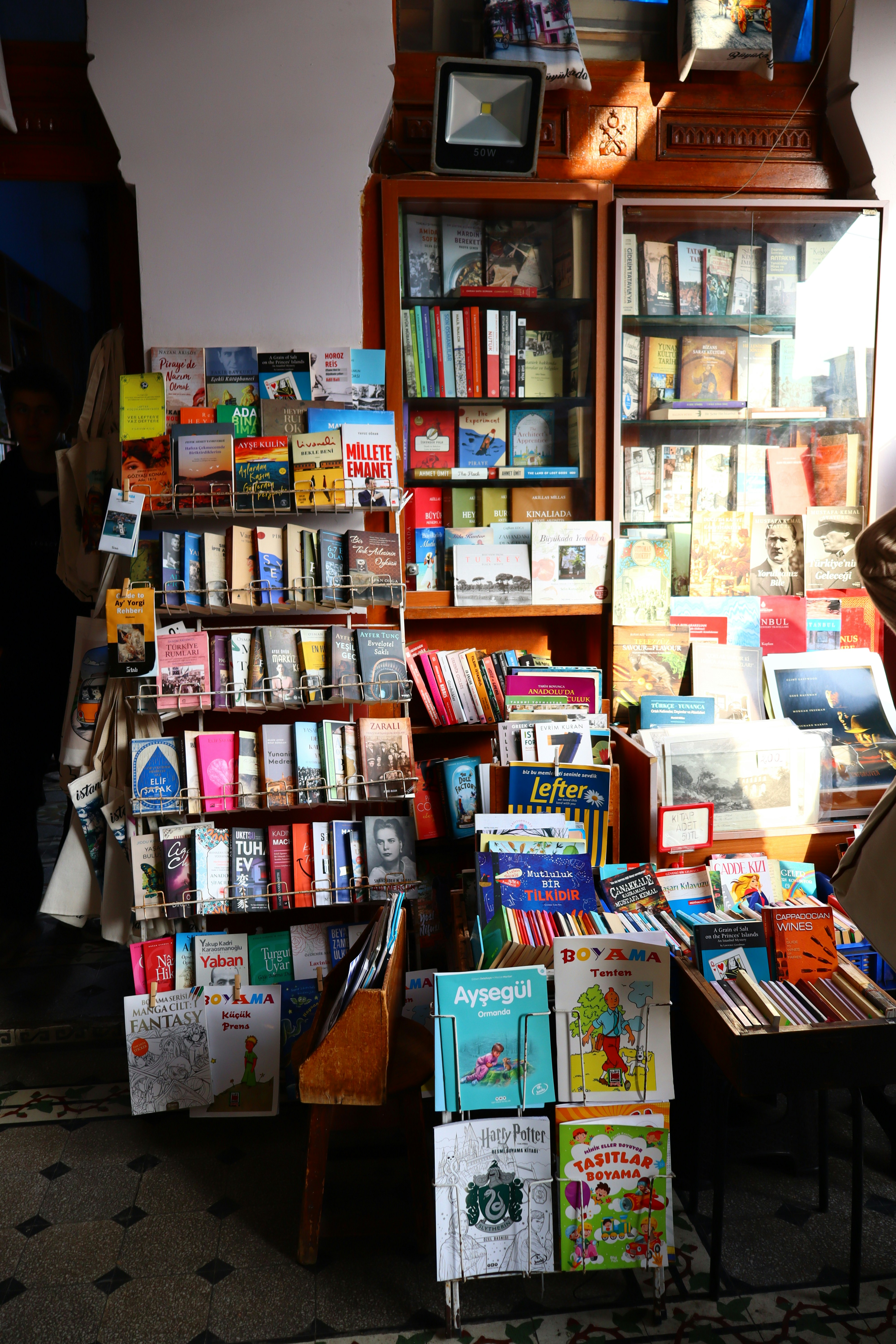 Kaleidoscope of Titles: A City Street Bookstall Brimming with Color