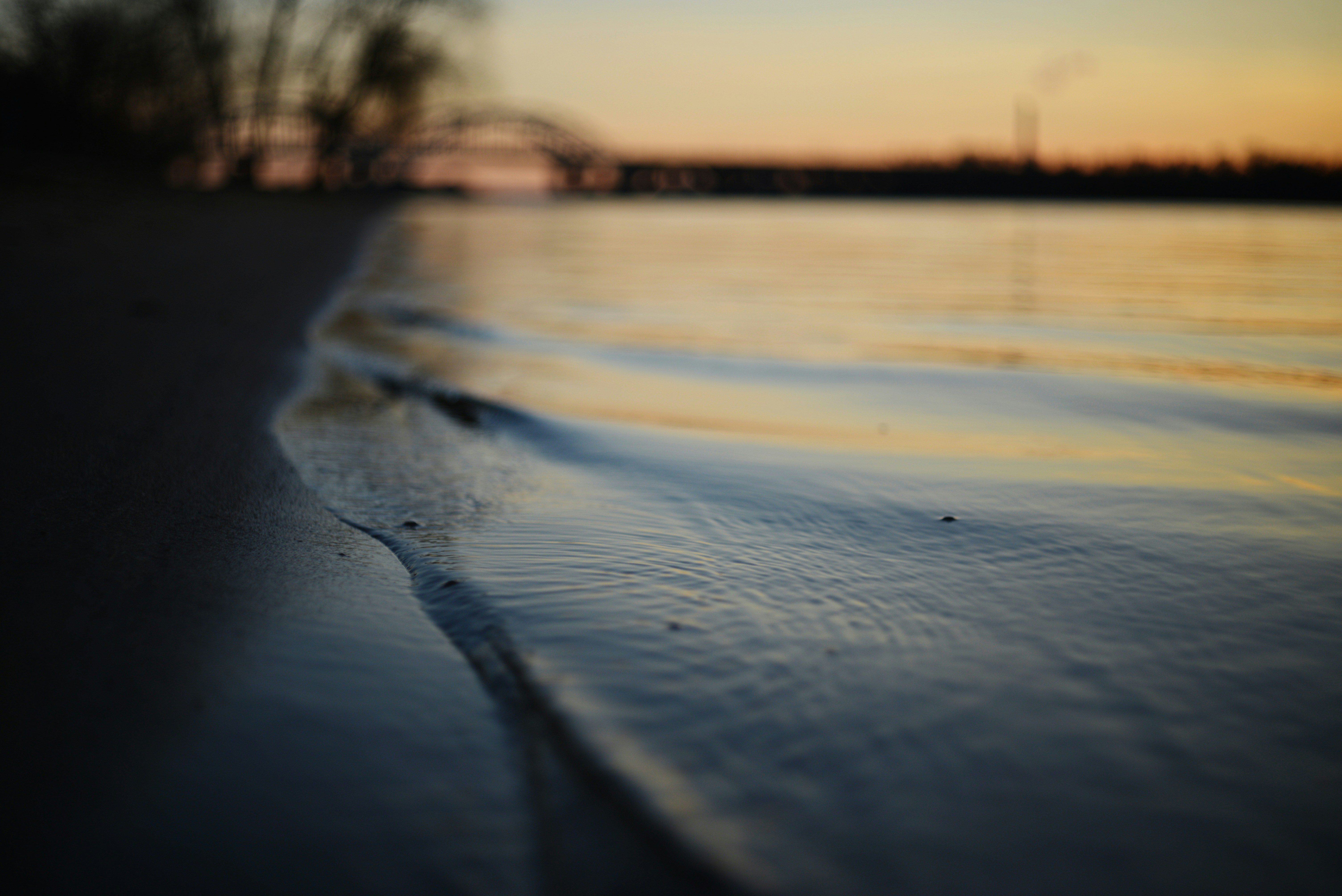 Tide's Edge at Dusk: A Low-Angle Study of Wet Sand and Quiet Light