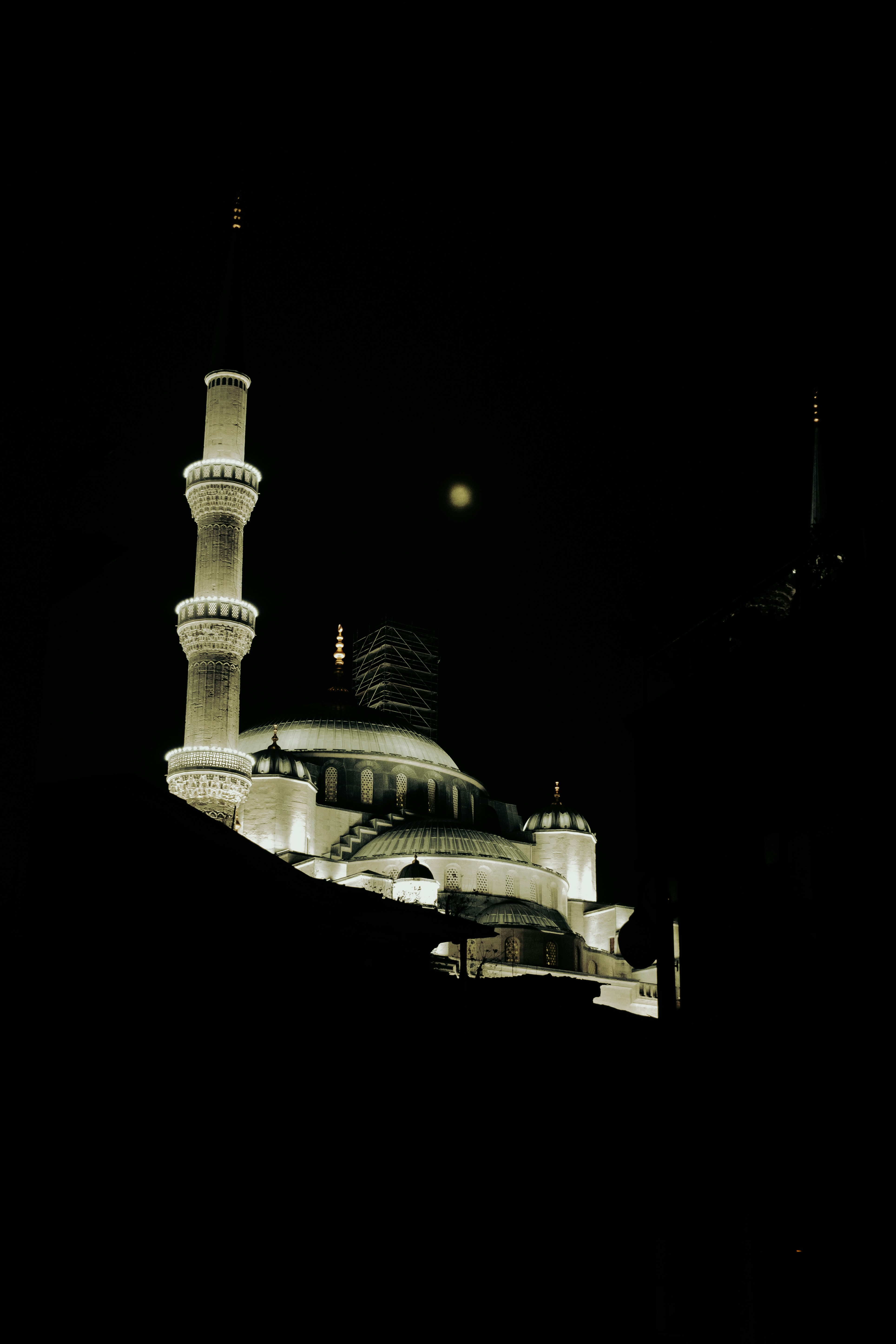 Moonlit Minarets: Night Illumination of a Quiet Mosque