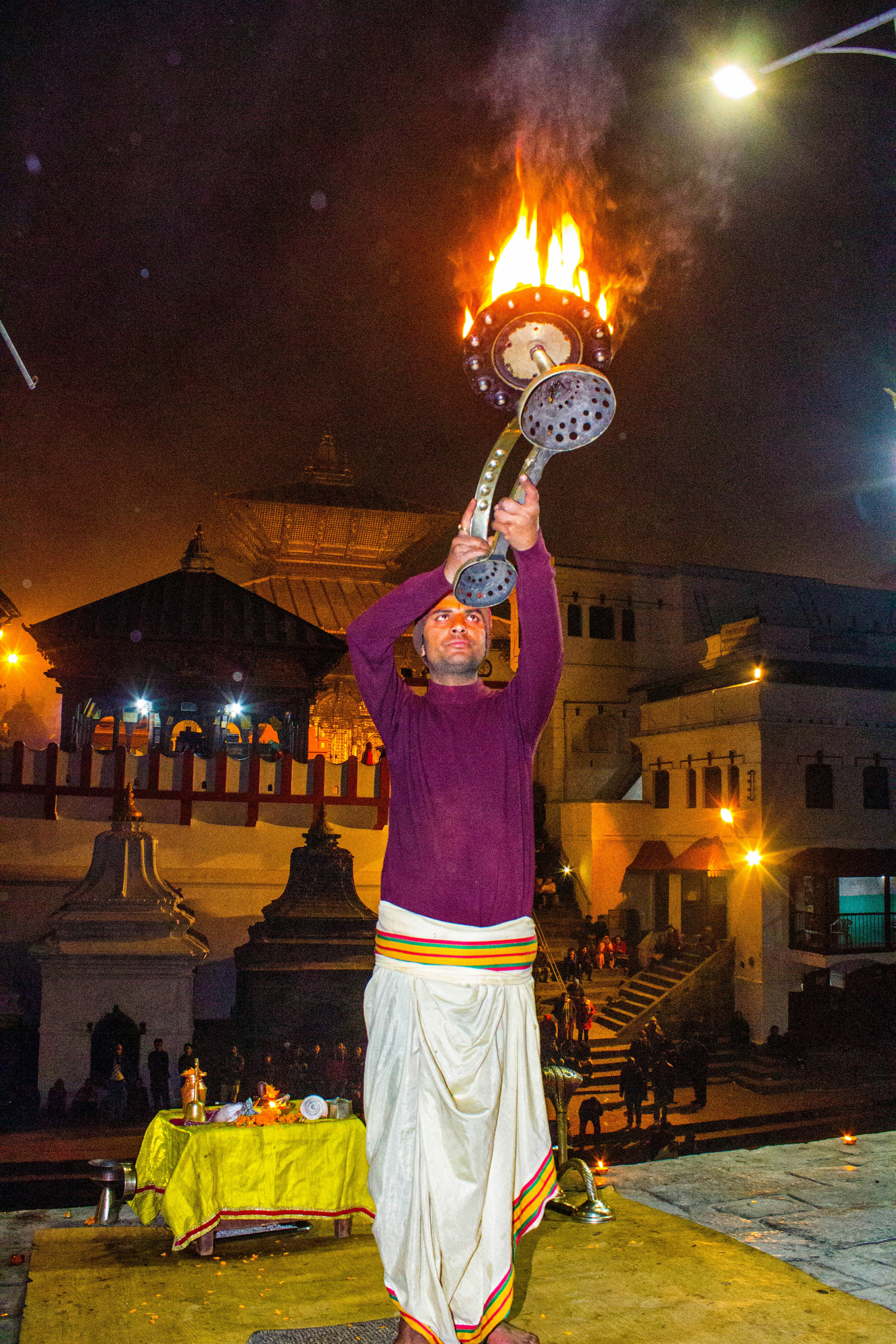 Torchbearer in Front of Sacred Steps