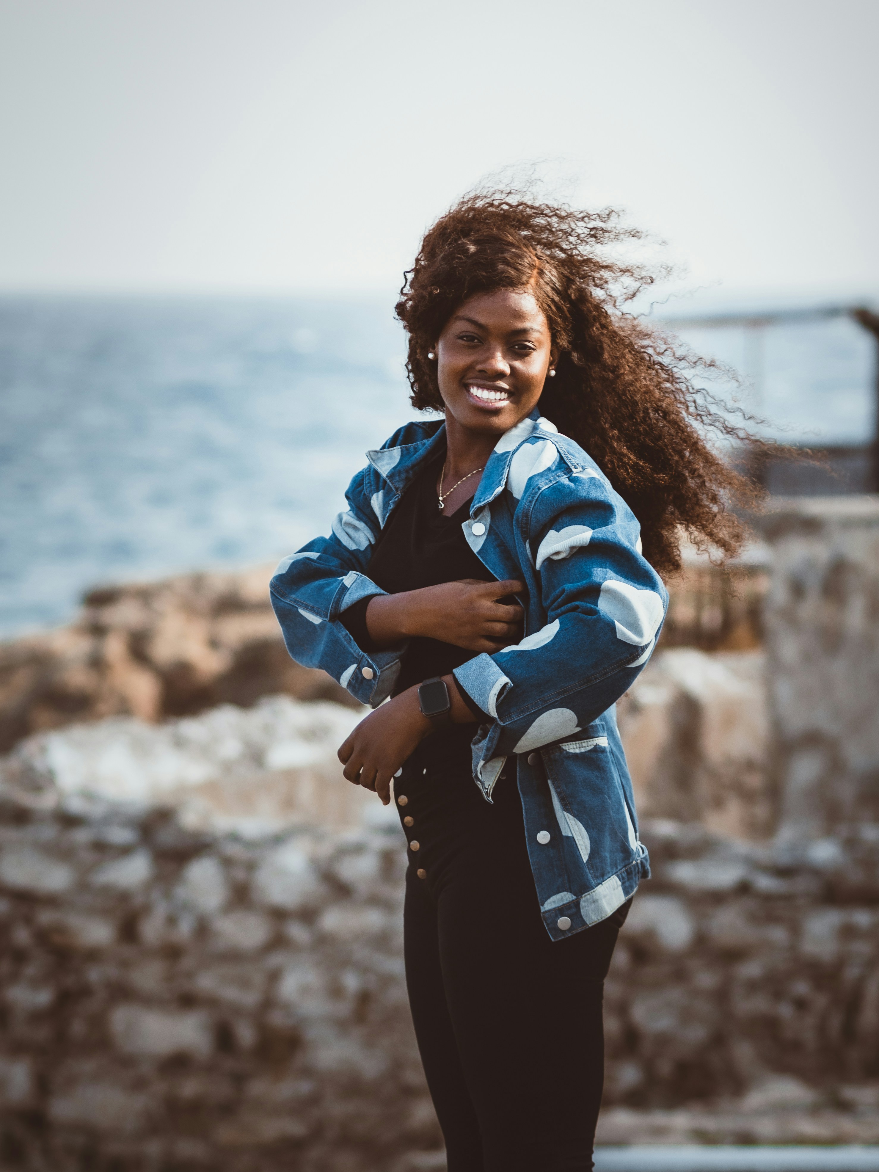 Sea-Breeze Portrait: Denim Jacket, Wind-Sculpted Hair by the Breakwater
