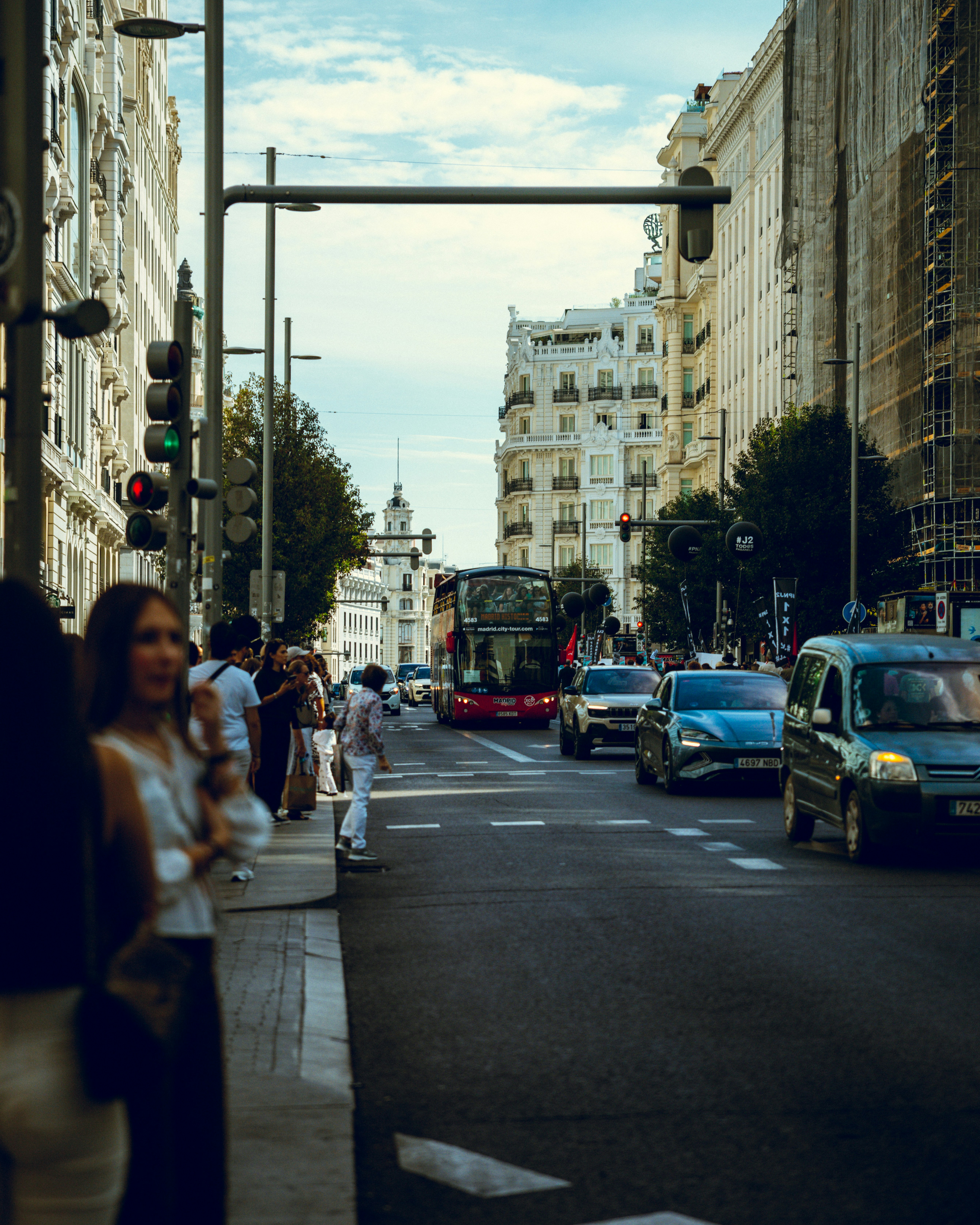 Red Bus Crossing: A Lively London Street in Motion