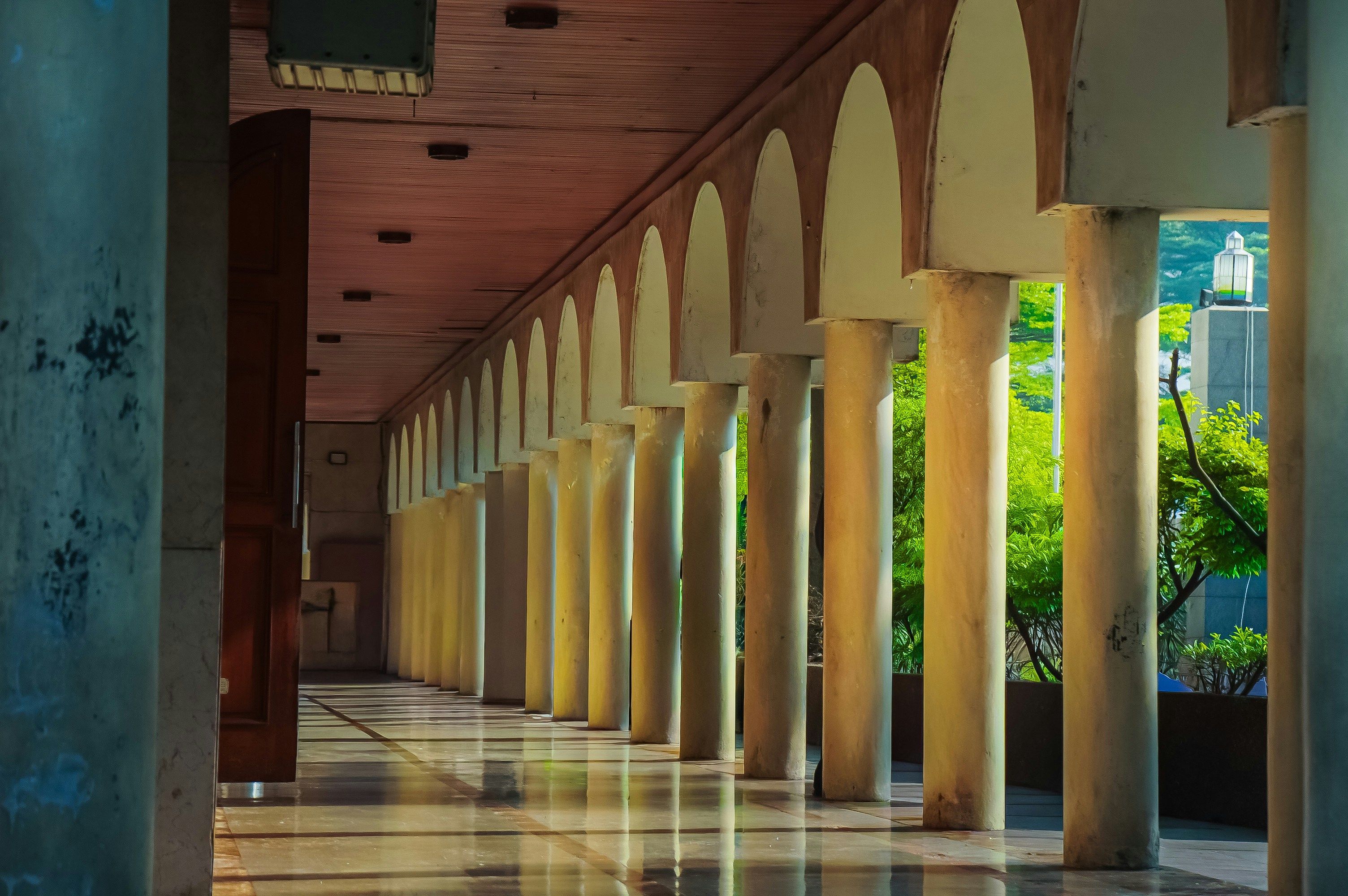Vanishing Light Through the Archway Corridor