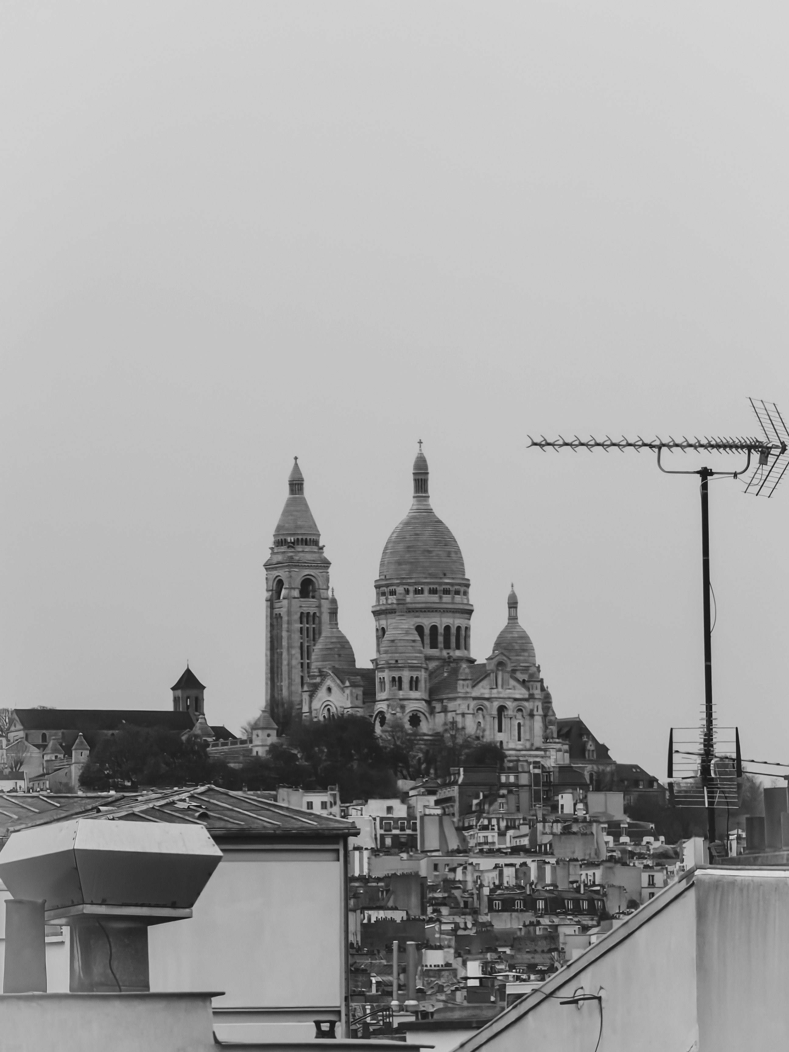 Montmartre's Basilica Silhouette Over a Sea of Rooftops