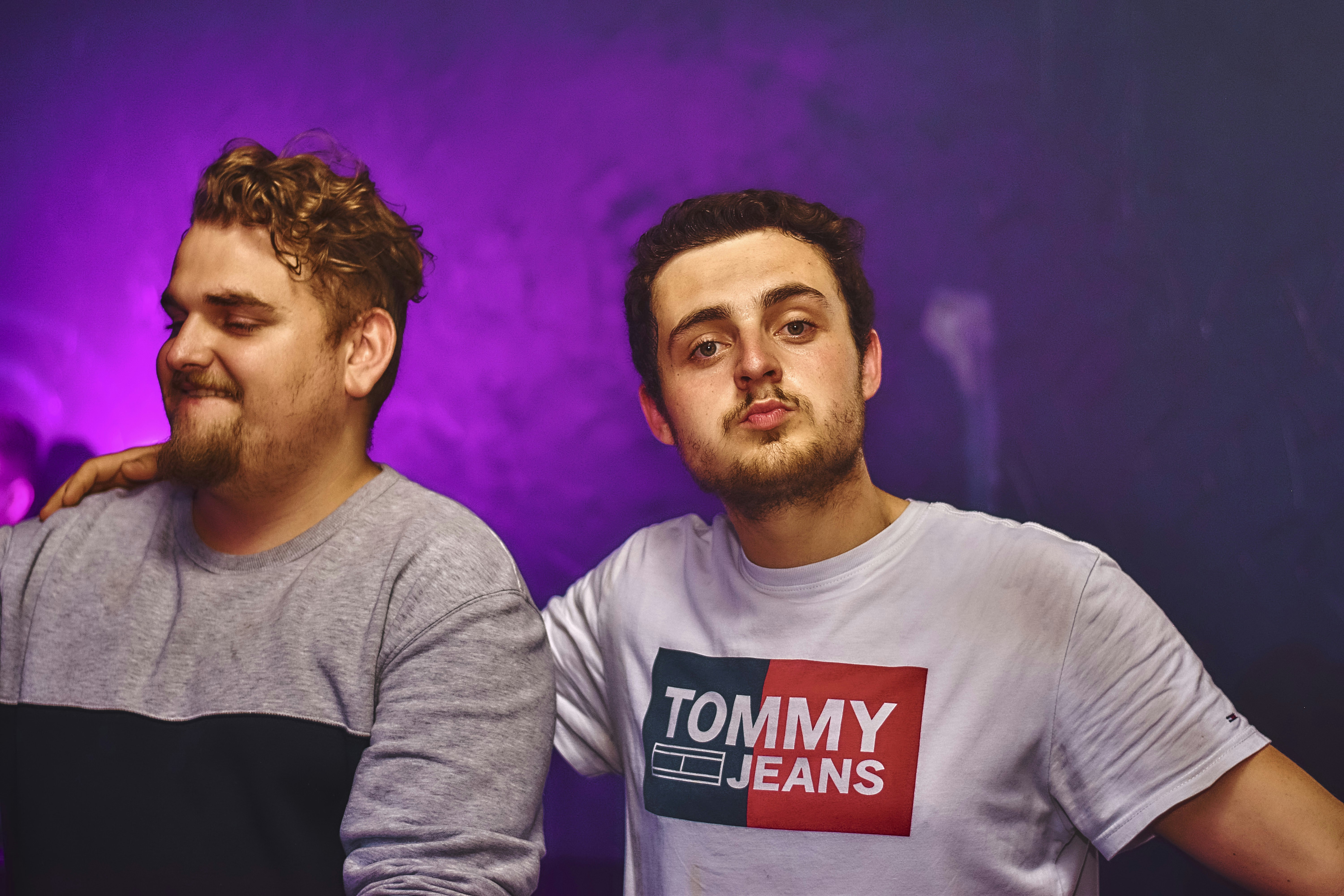 Two young men posing for the camera