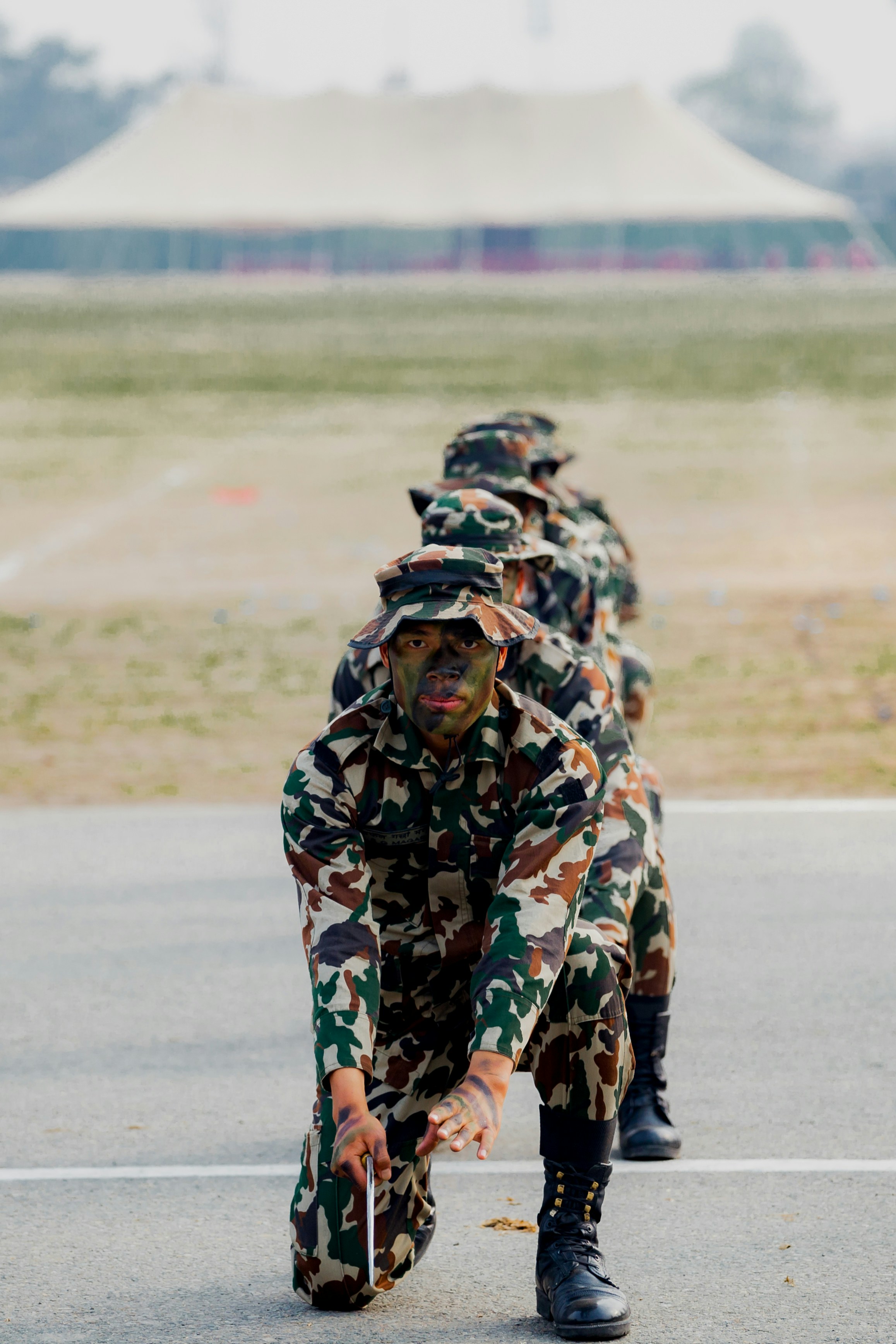 Camouflage Cadence: Kneeling Drill on an Open Airfield