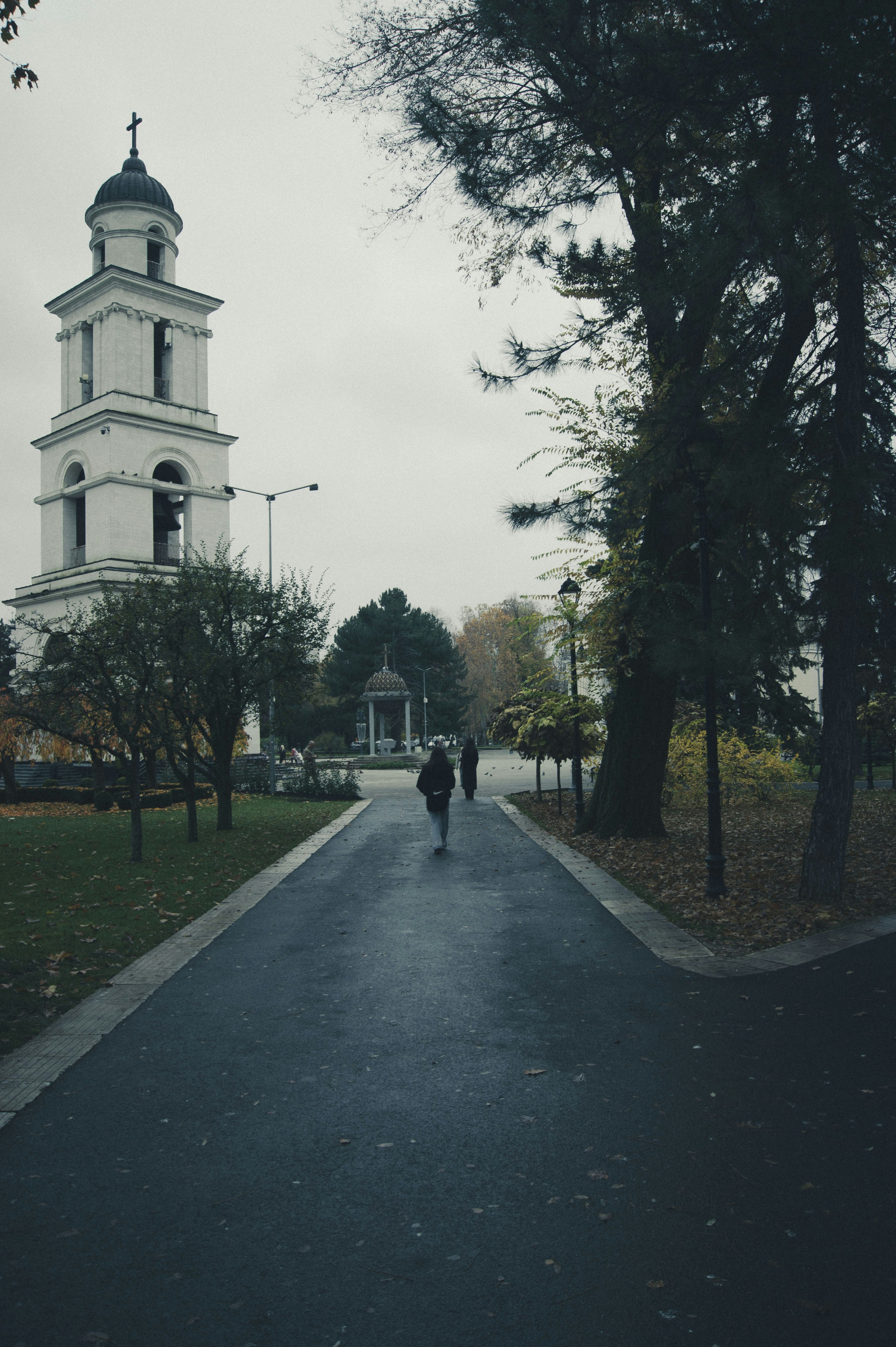 Path to the Bell Tower: An Autumn Park Portrait