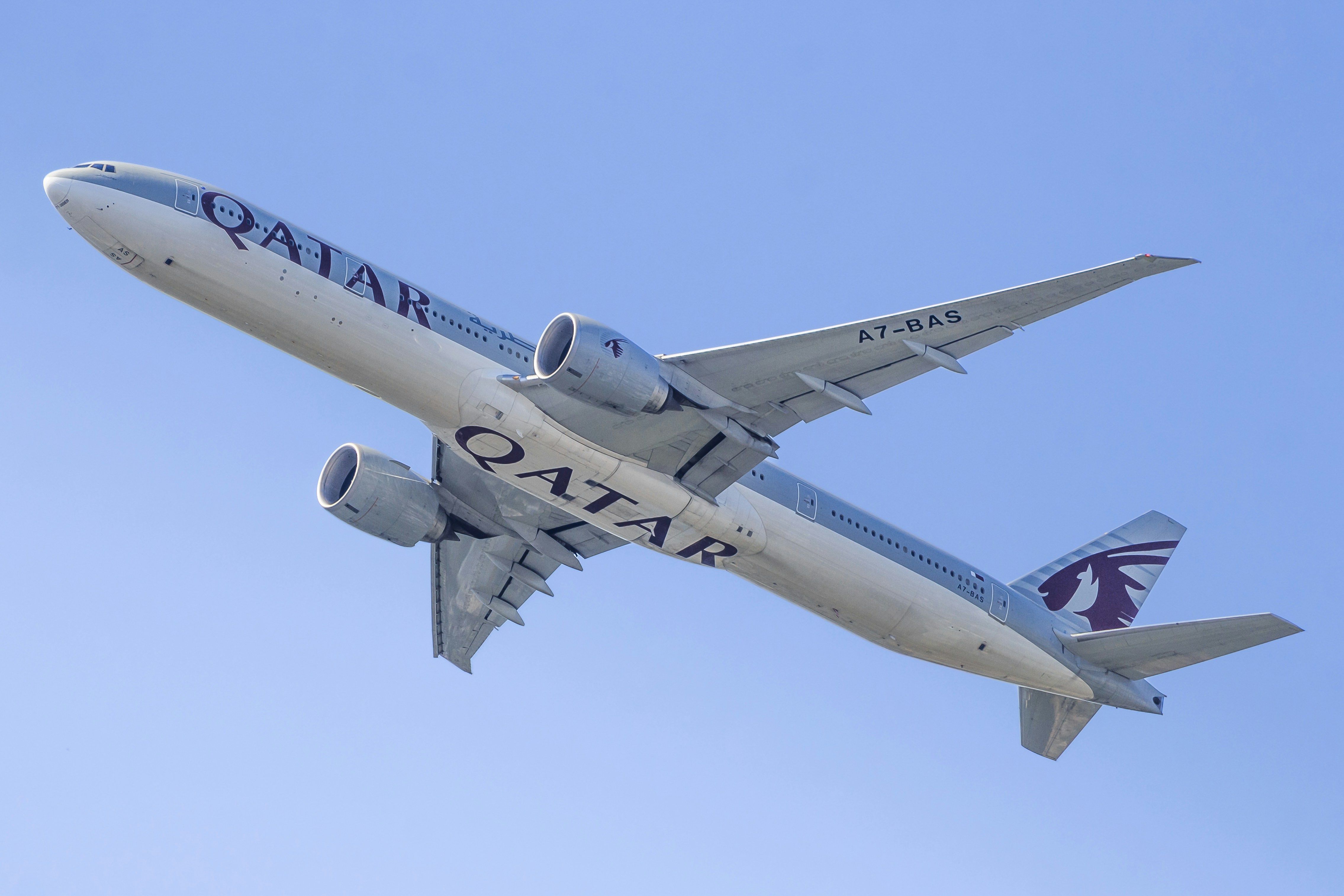 Qatar Airways A350 in Cerulean Skies: A Graceful Pass Across the Frame