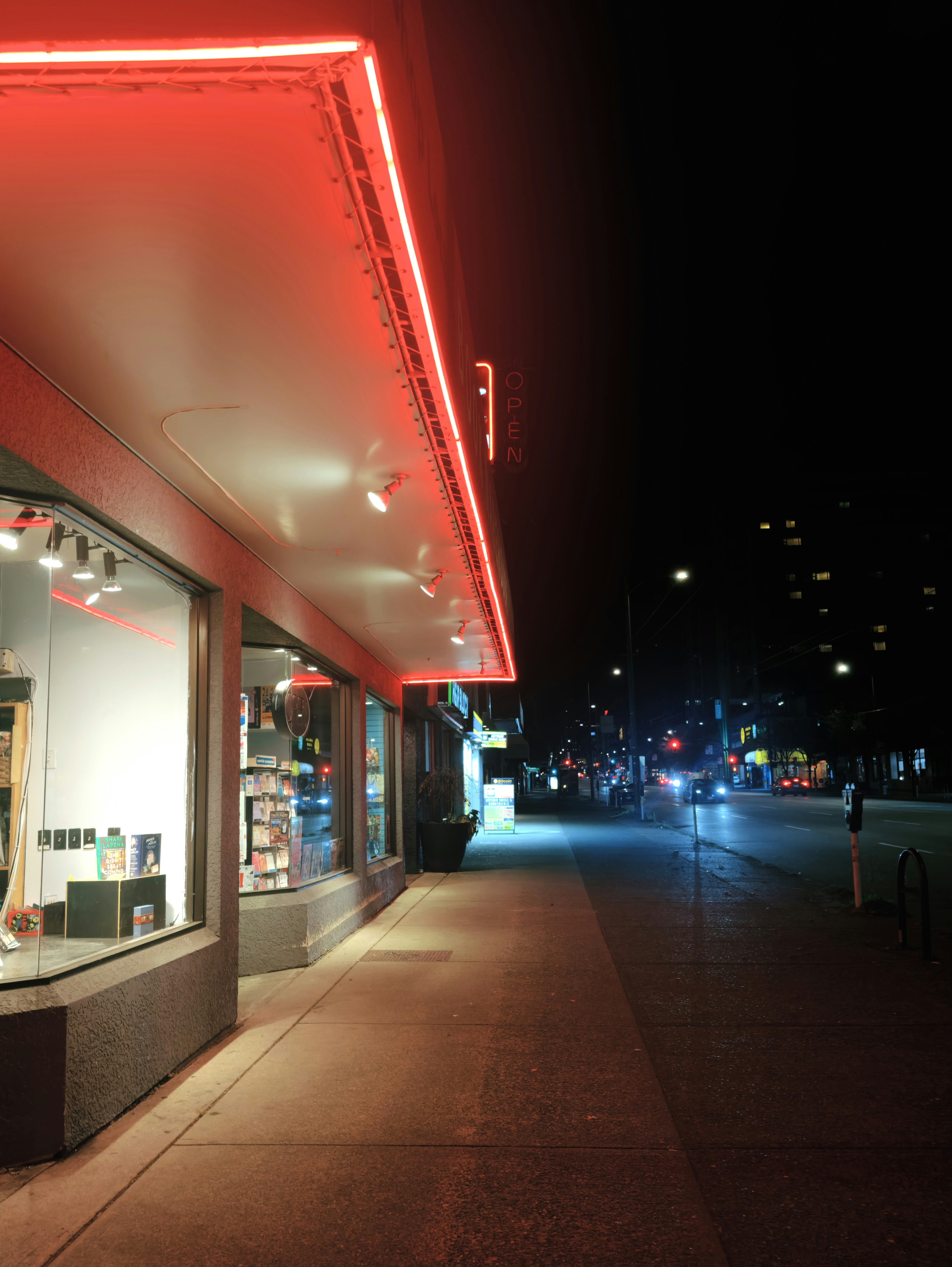 neon lights on West Broadway, Vancouver at night