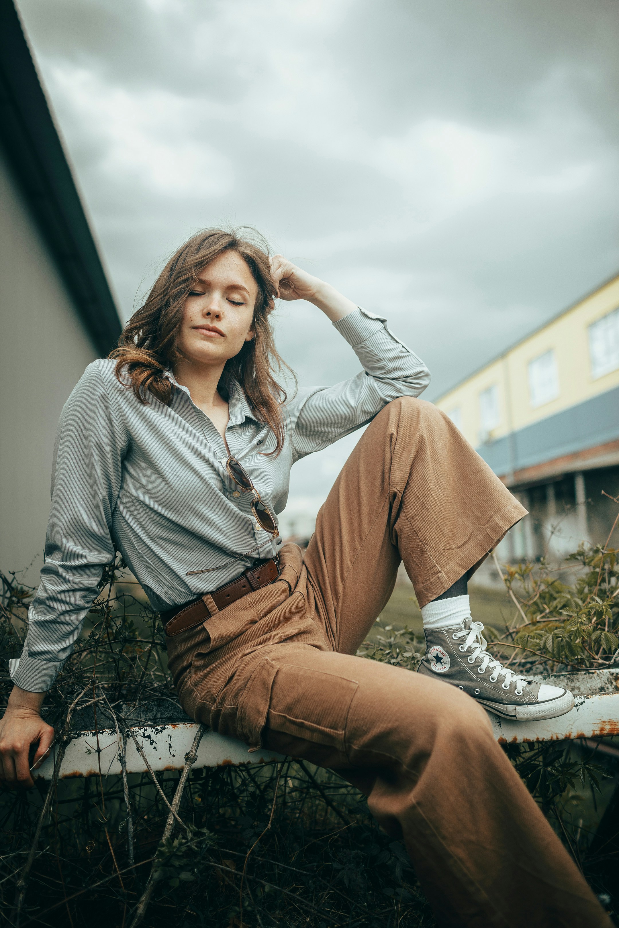 On the Edge of Industry: A Quiet Portrait Against Grey Skies