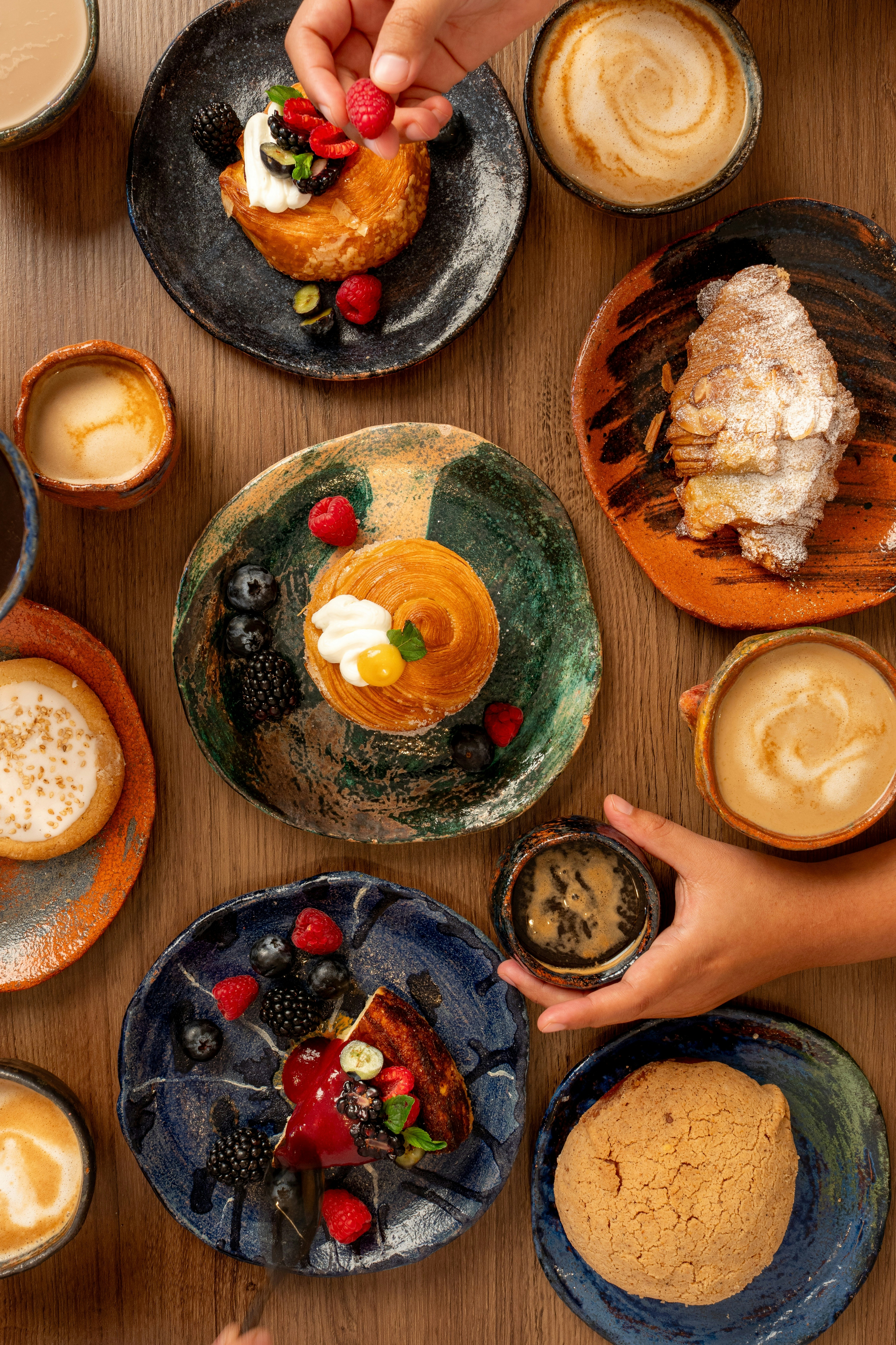 Sweet Mosaic: A Top‑Down Spread of Pastries and Coffees