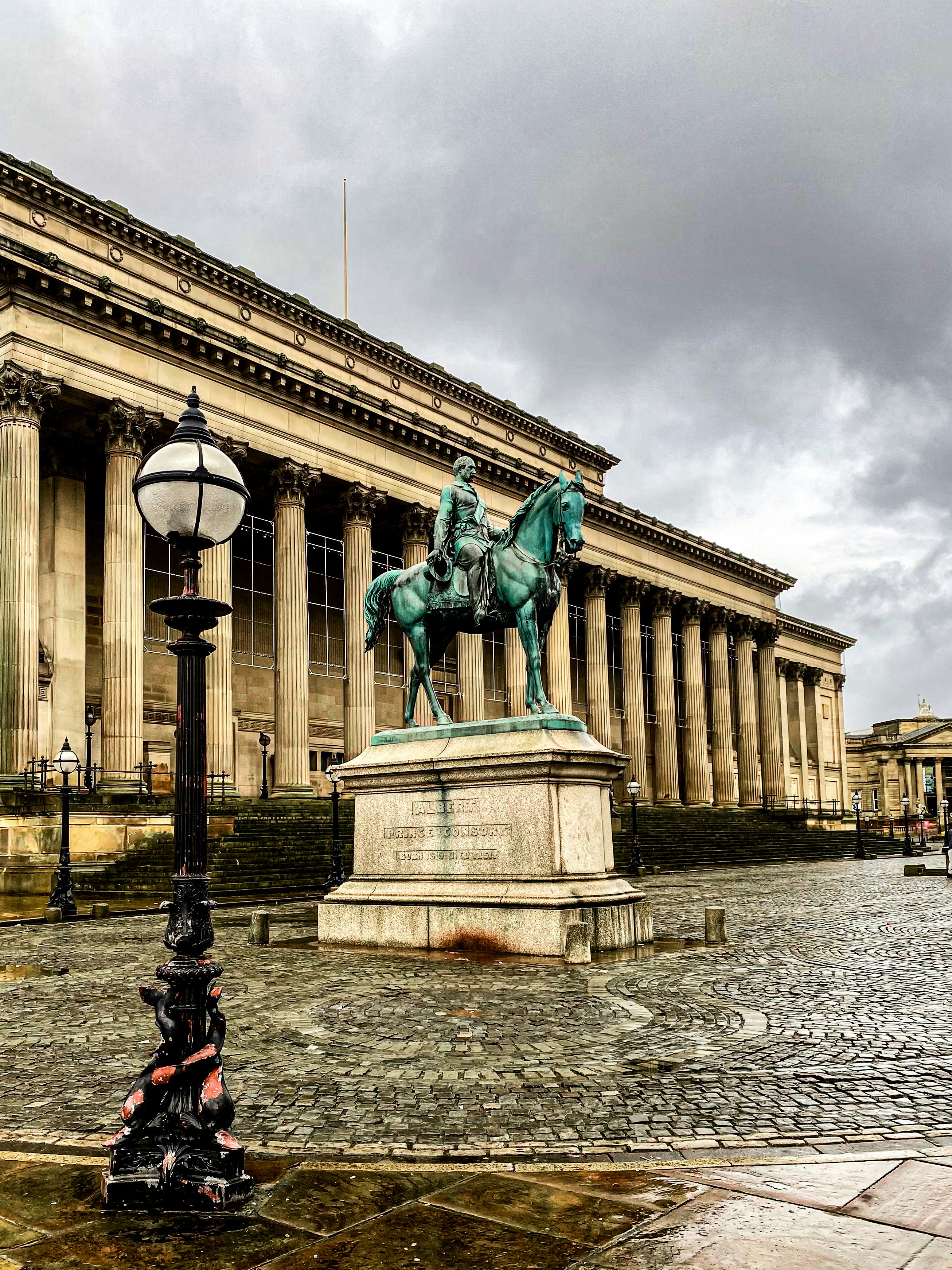 Equestrian Sentinel Before a Neoclassical Façade on a Rain-Washed Square