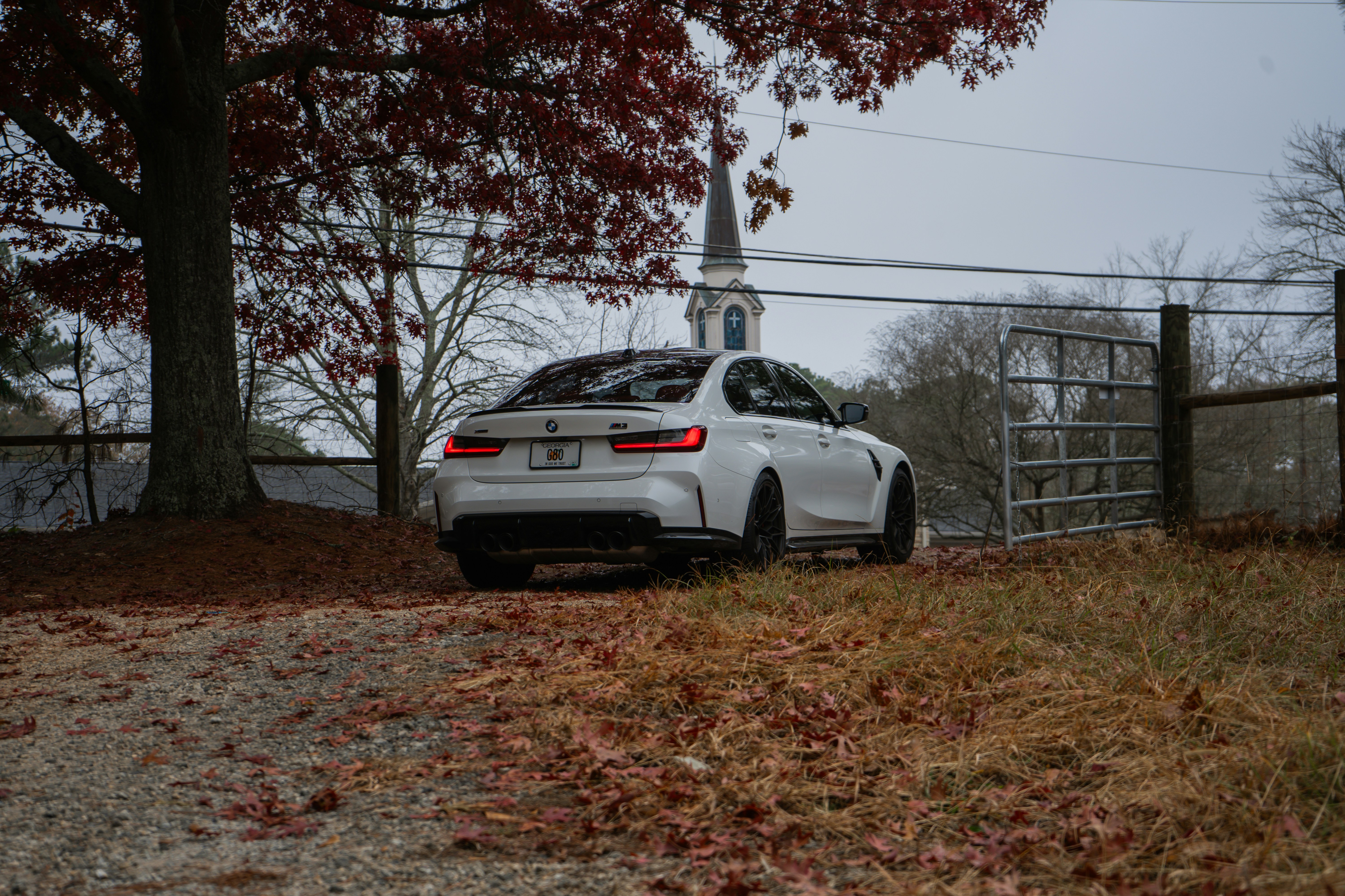 Autumn Quiet: A White Sedan by the Village Church