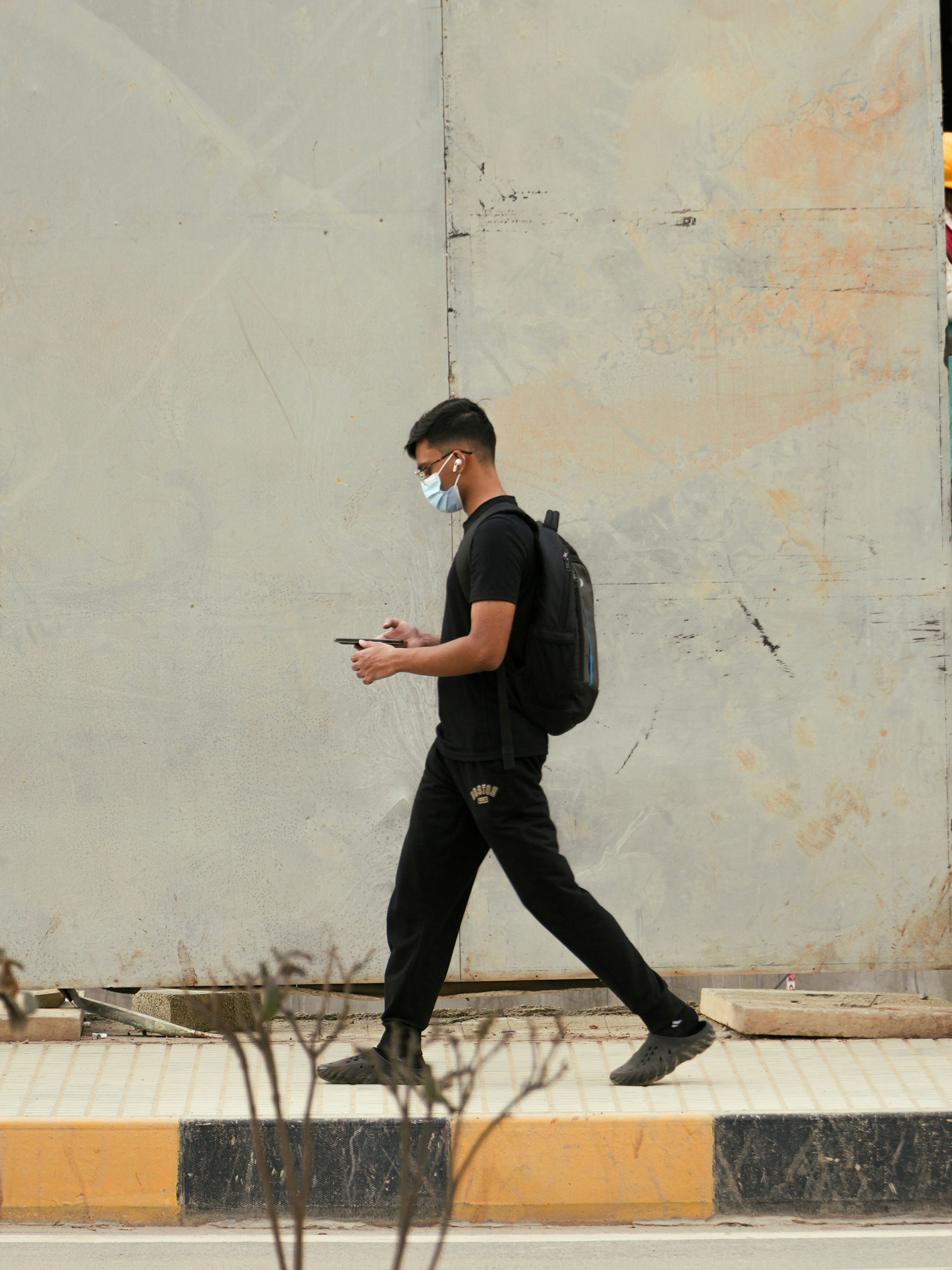 Stride and Signal: A Masked Walker Navigates a Concrete Canvas