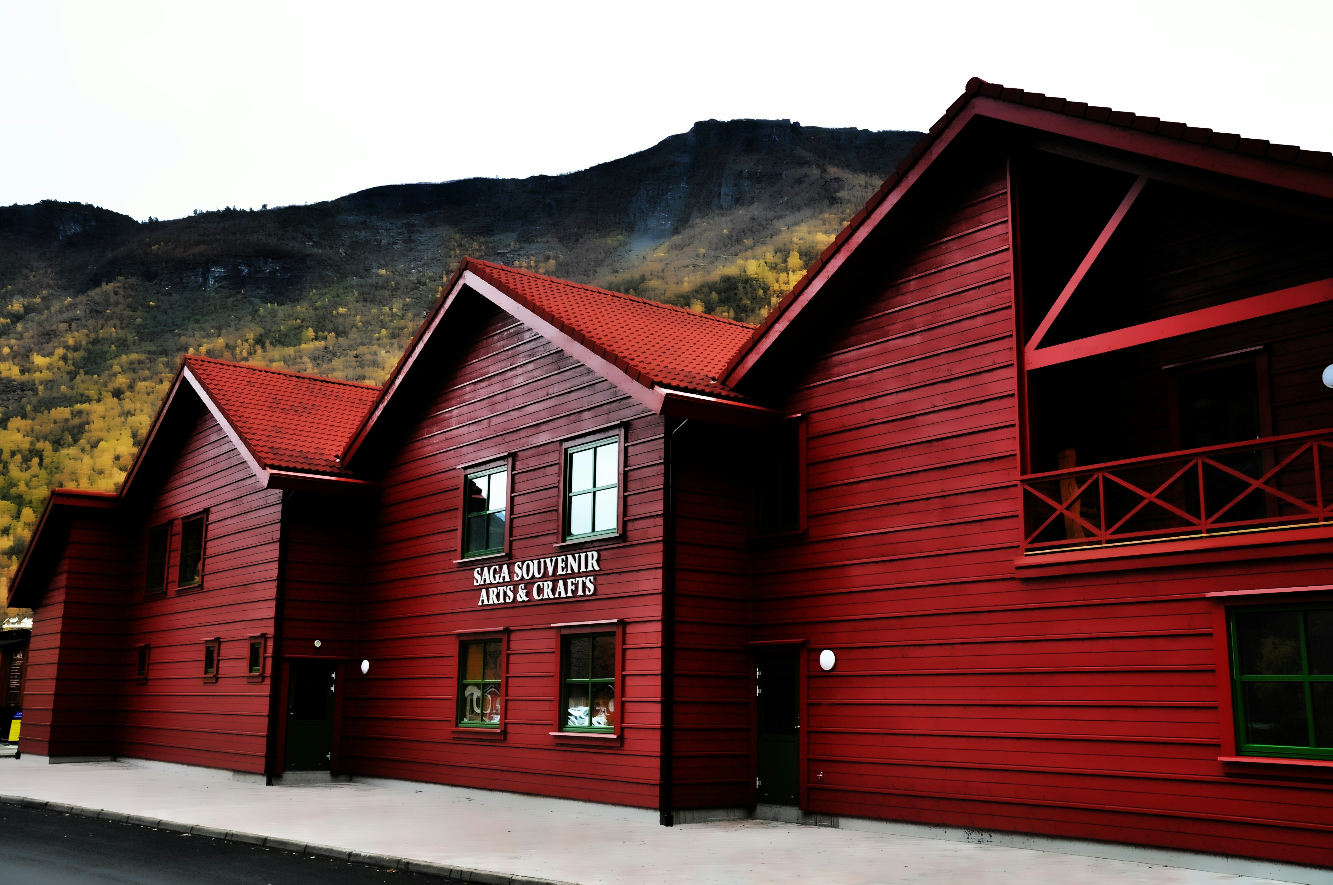 Crimson Timber Rows Under Alpine Sky