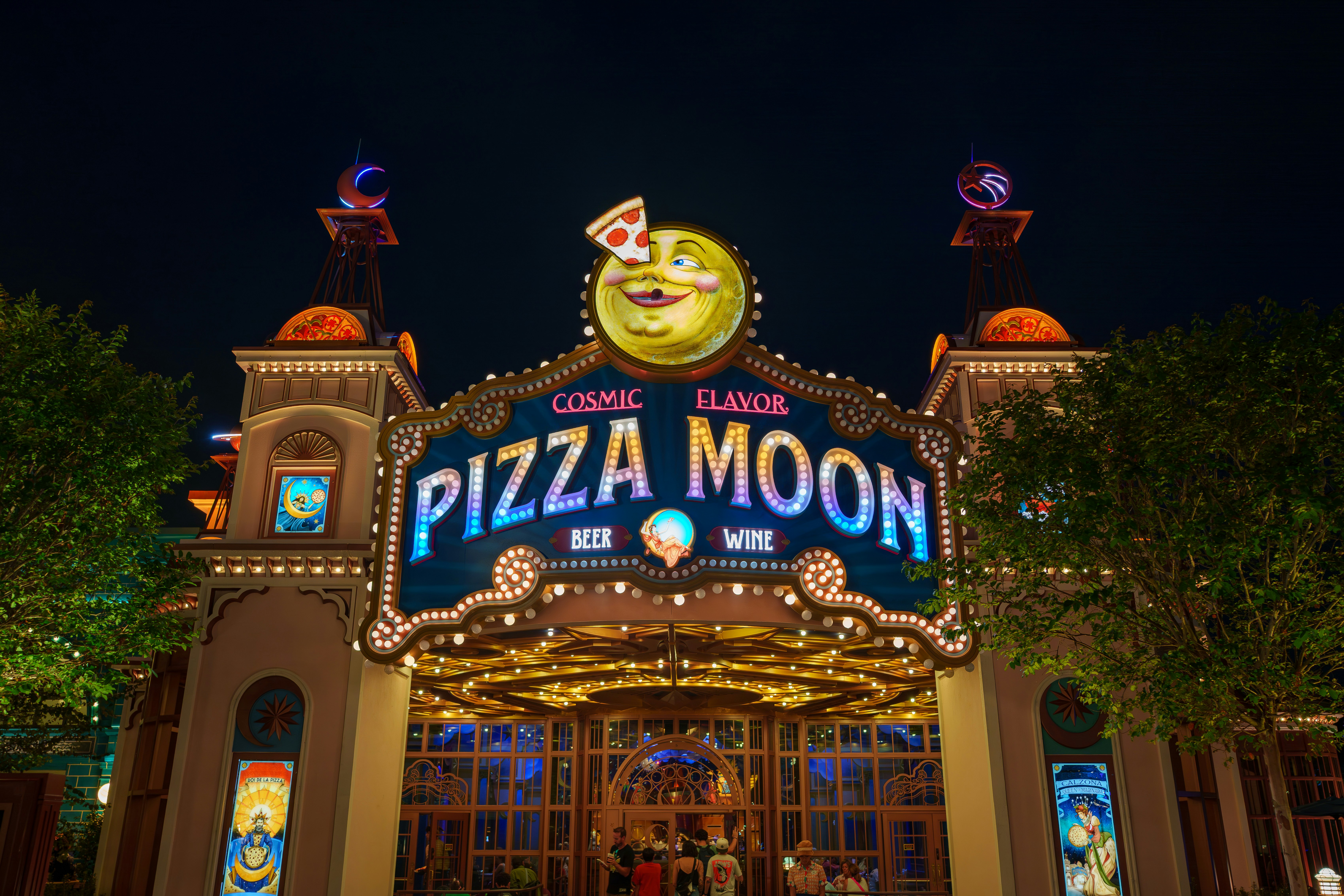 Neon Moon Over the Pizza Moon Marquee: Lunar Glow on a Night Entrance
