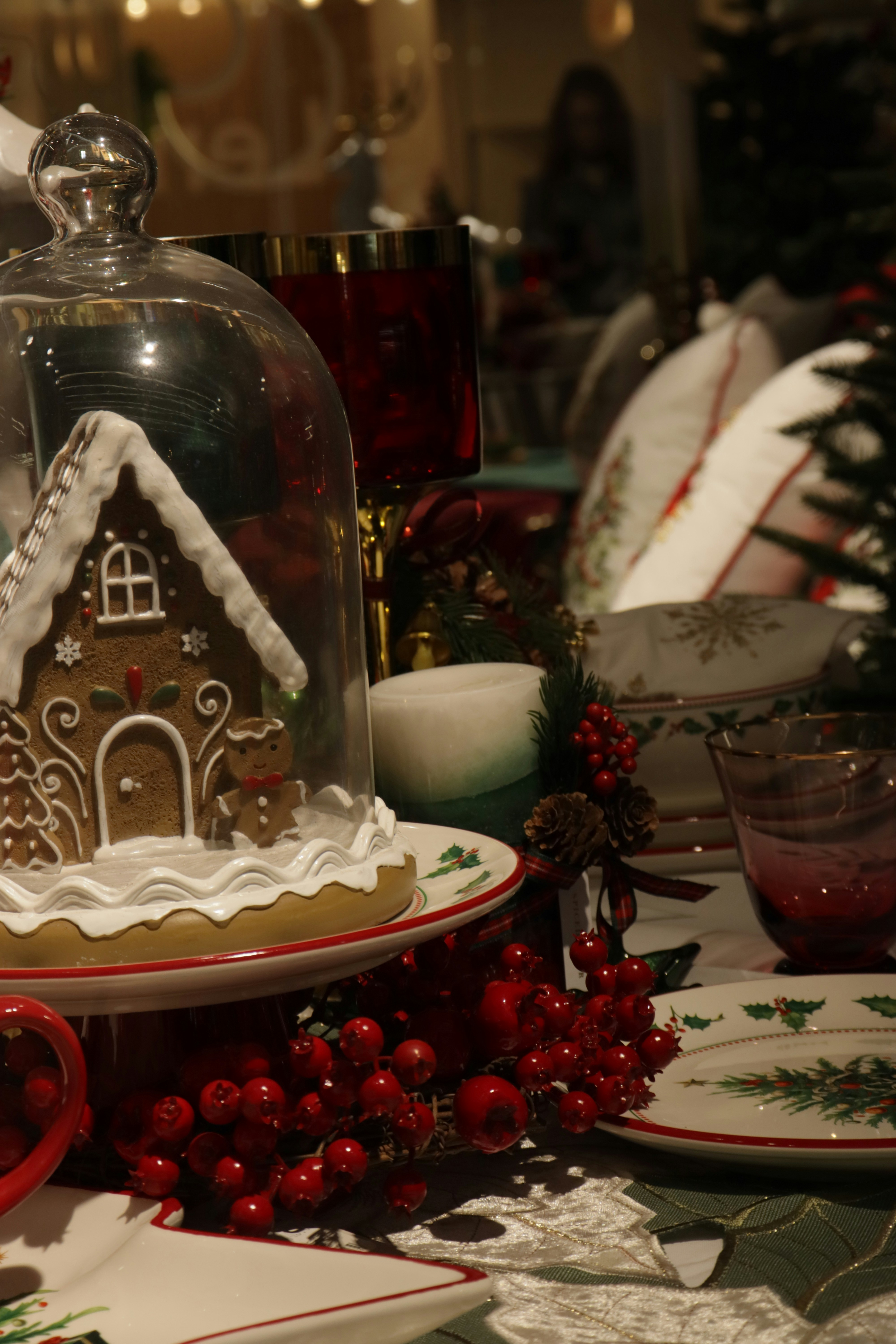 Under Glass and Glitter: A Gingerbread Cottage on a Berry-Laden Table