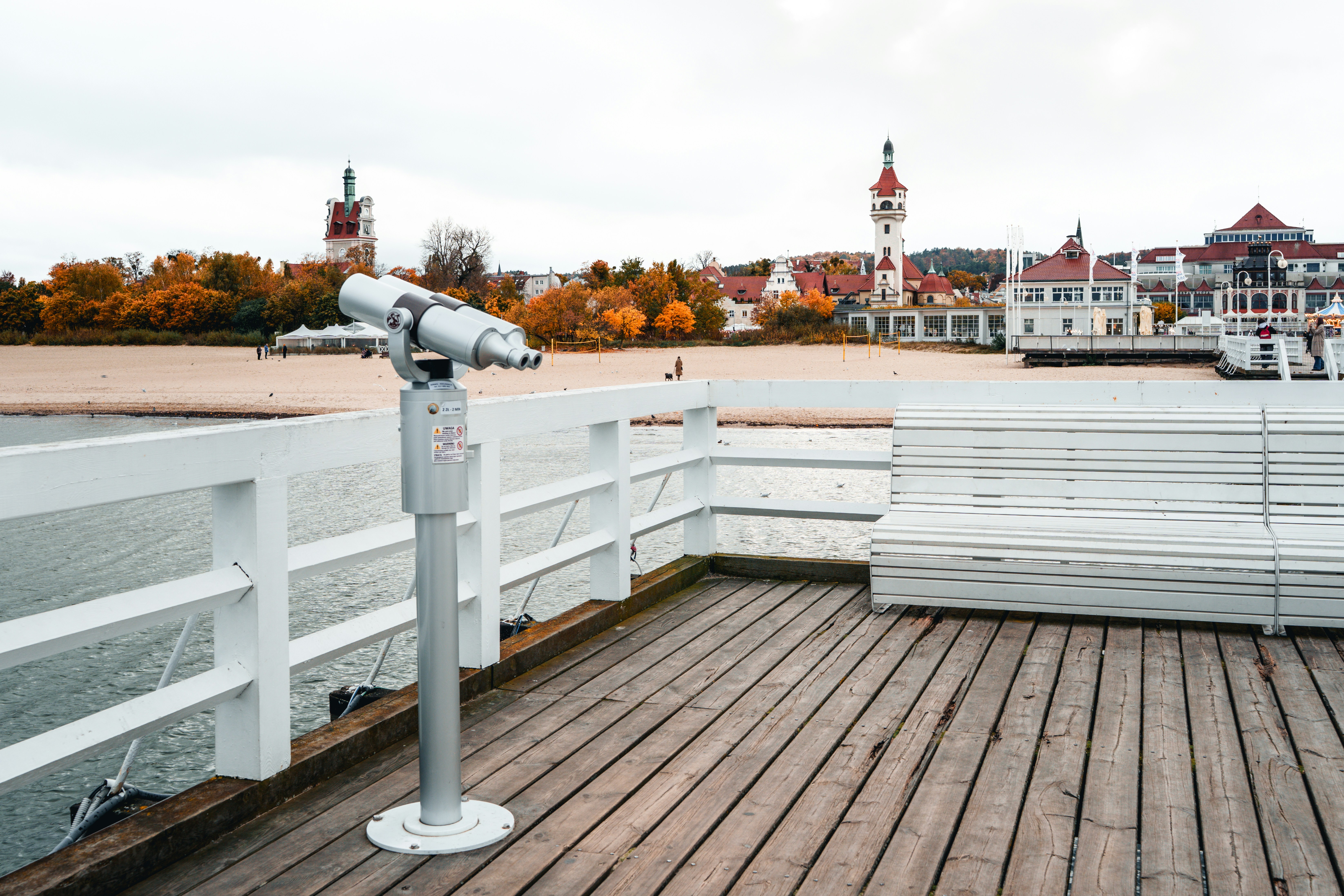 Autumn Harbor from the Pier: A Telescope Sees the Town Across Water