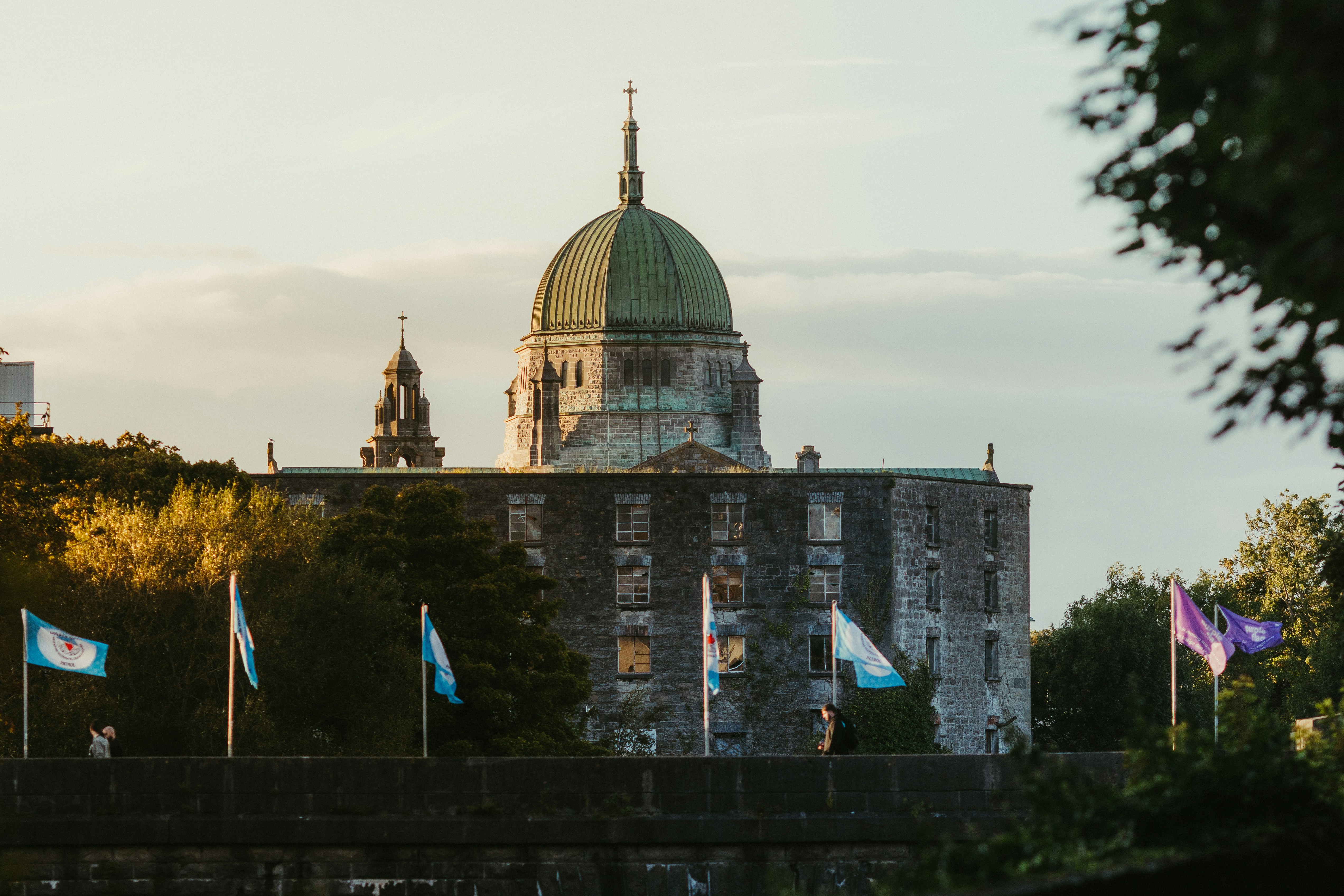 Copper-Crowned Fortress: A Green Dome Over a Riverside Landmark