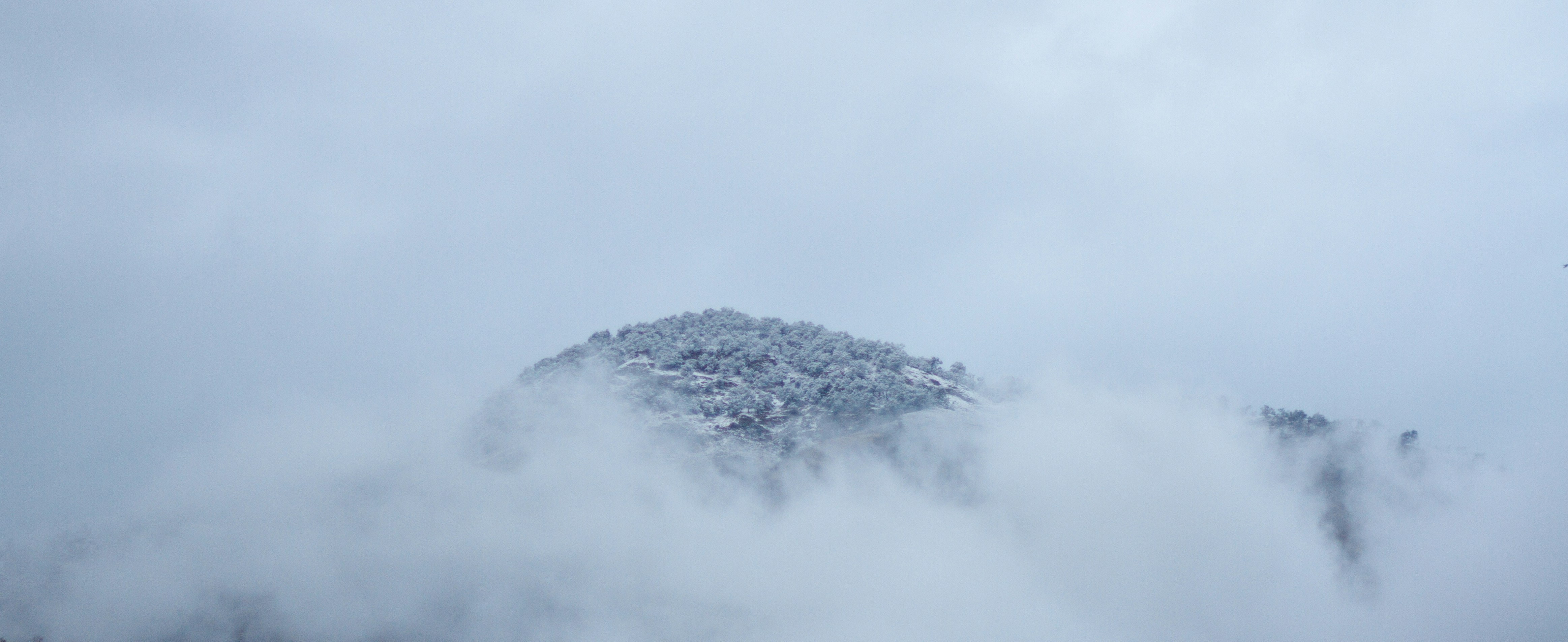 Summit Through the Cloud Veil