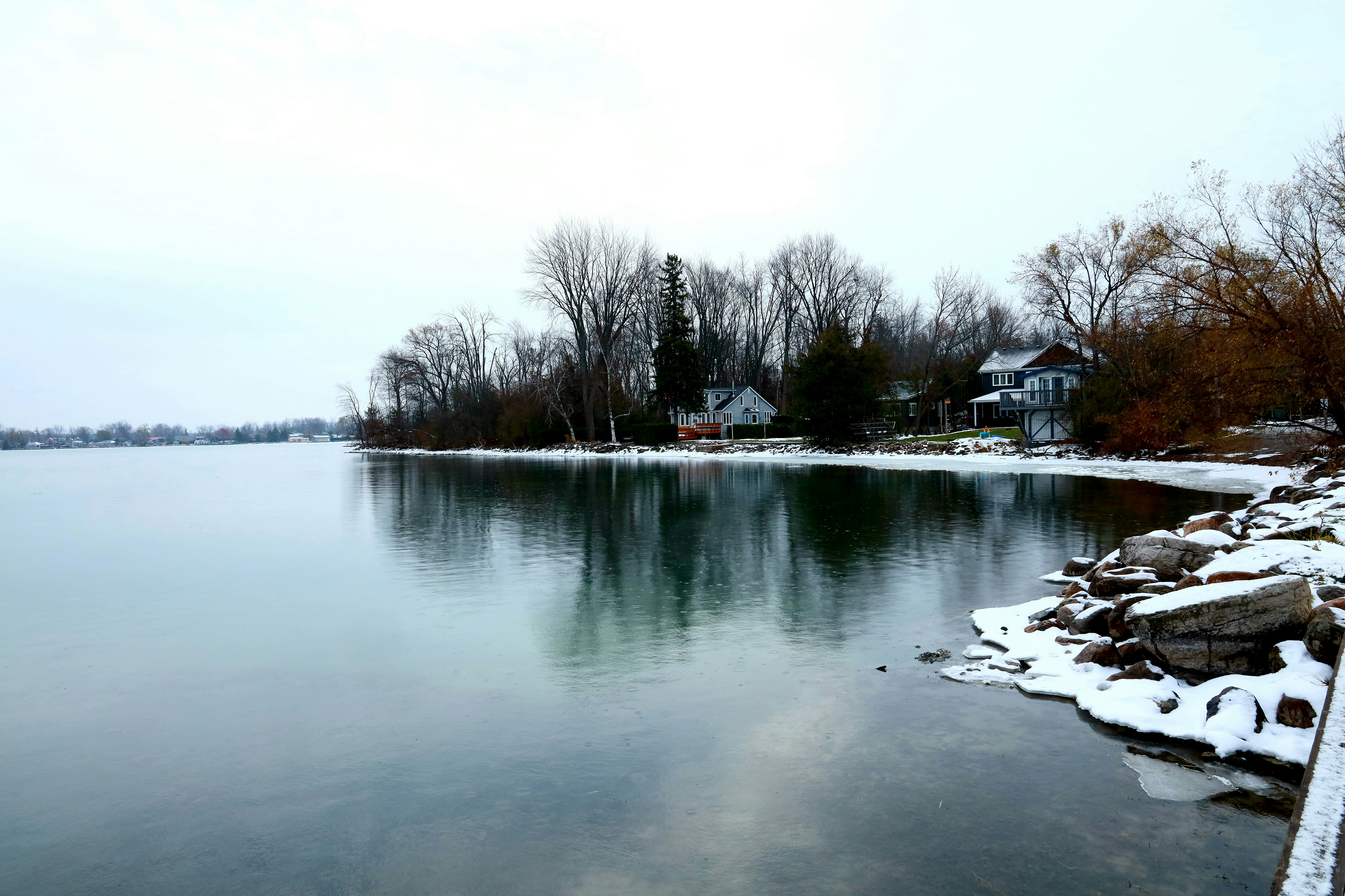 Hushed Reflections Along a Snow-Kissed Lakefront