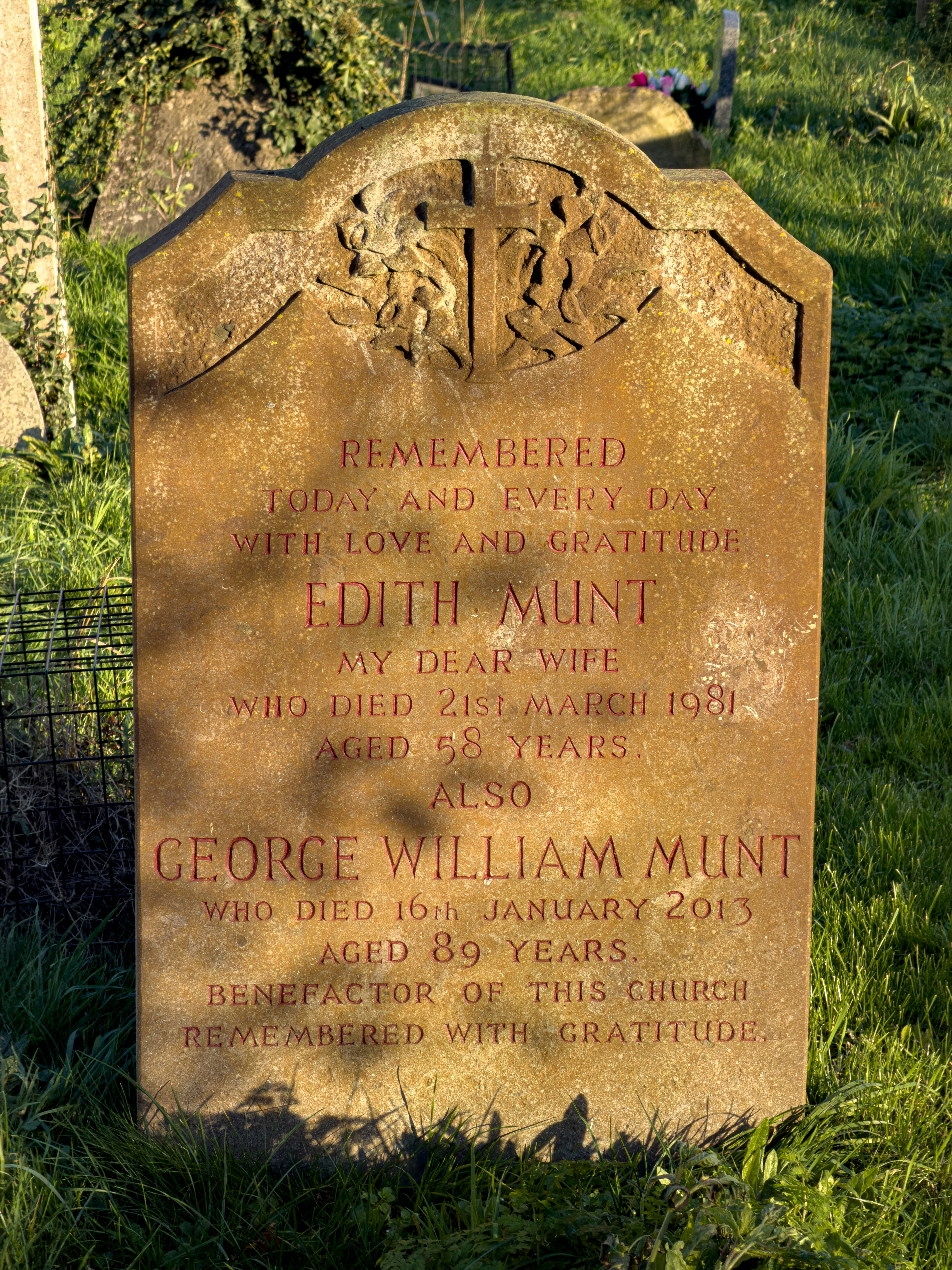 Sunlit Memorial Stone: Edith and George Munt in a Quiet Cemetery