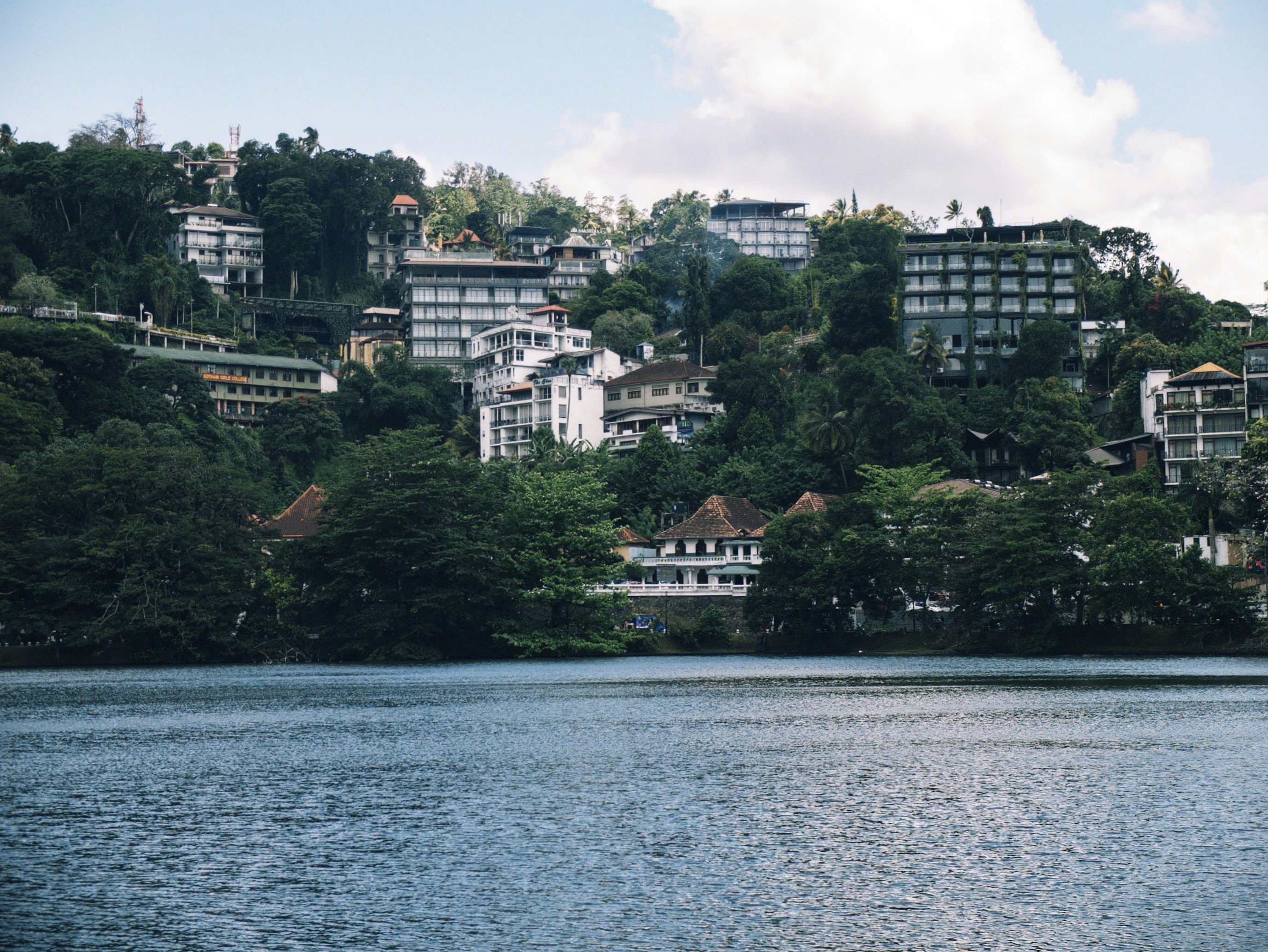 Terraced Lakeside: A Hillside Village Rising Above a Quiet Mirror of Water