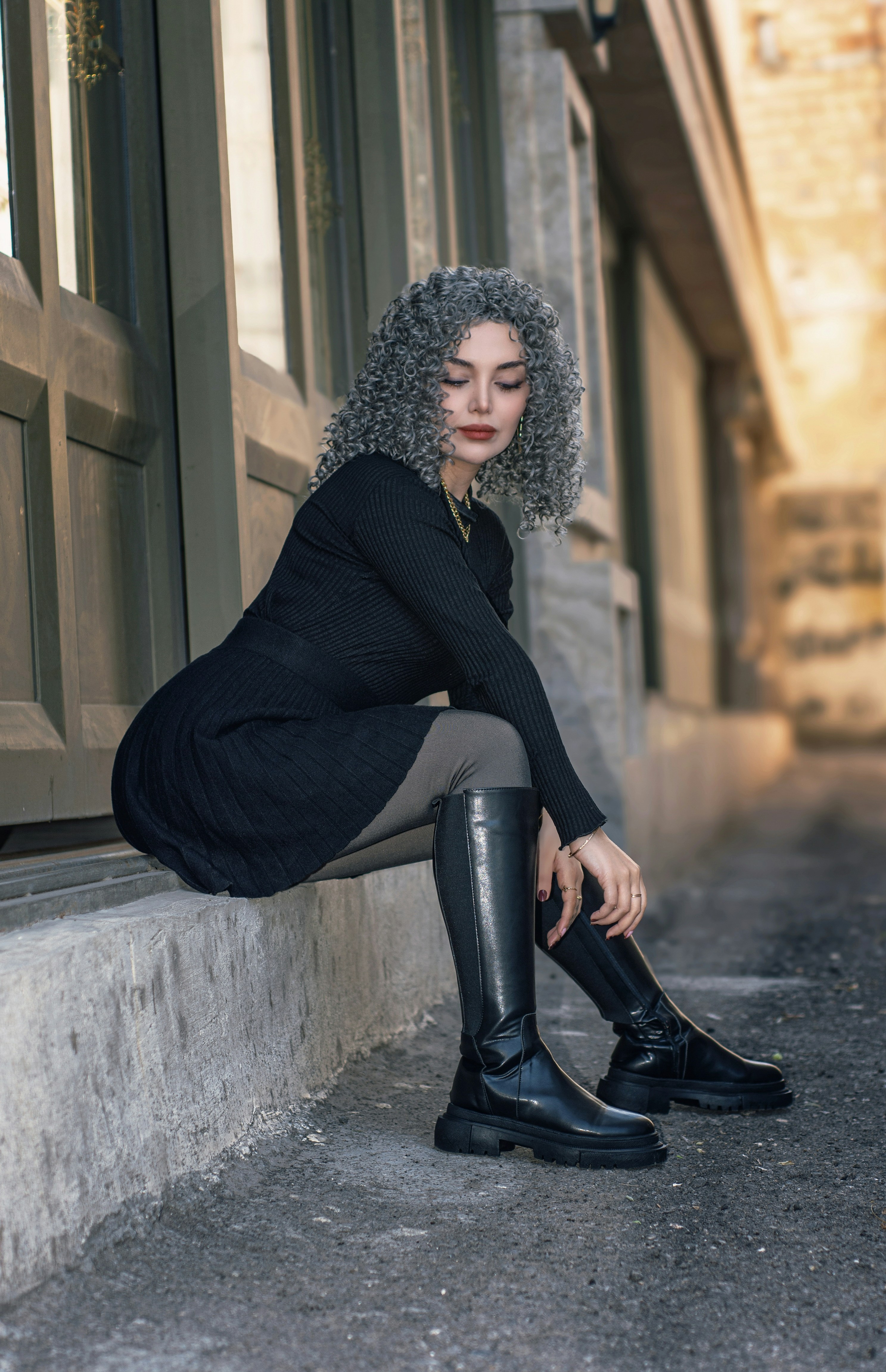 Curled Silver Hair on a City Edge: A Quiet Street Portrait