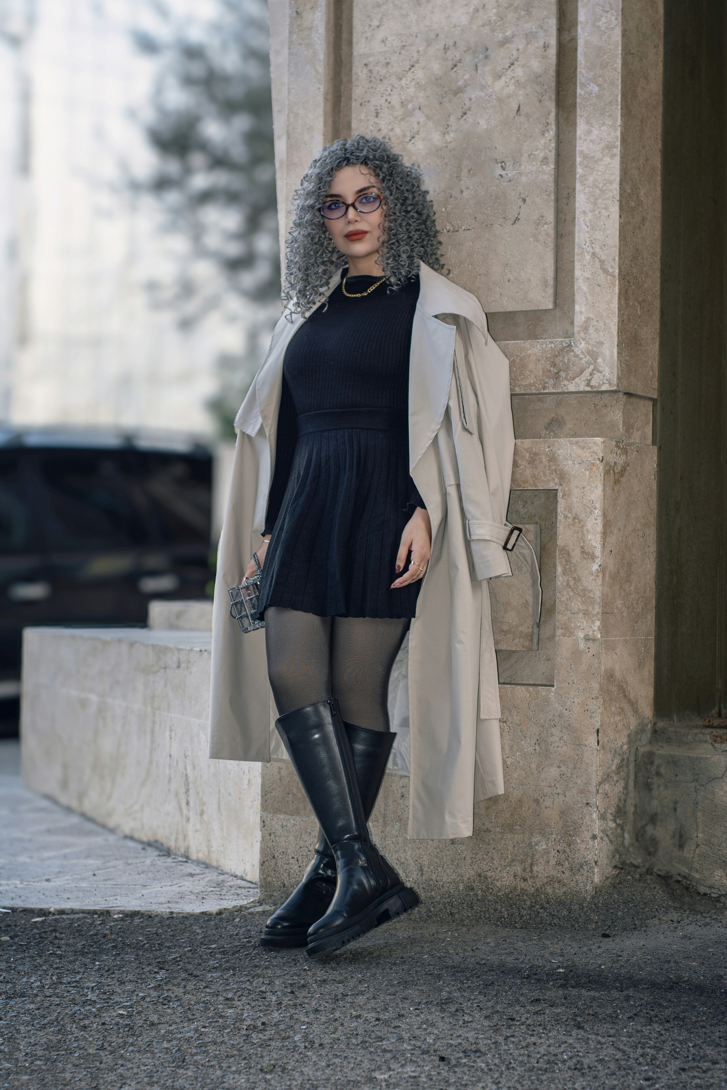 Colonnade Muse in a Trench Coat
