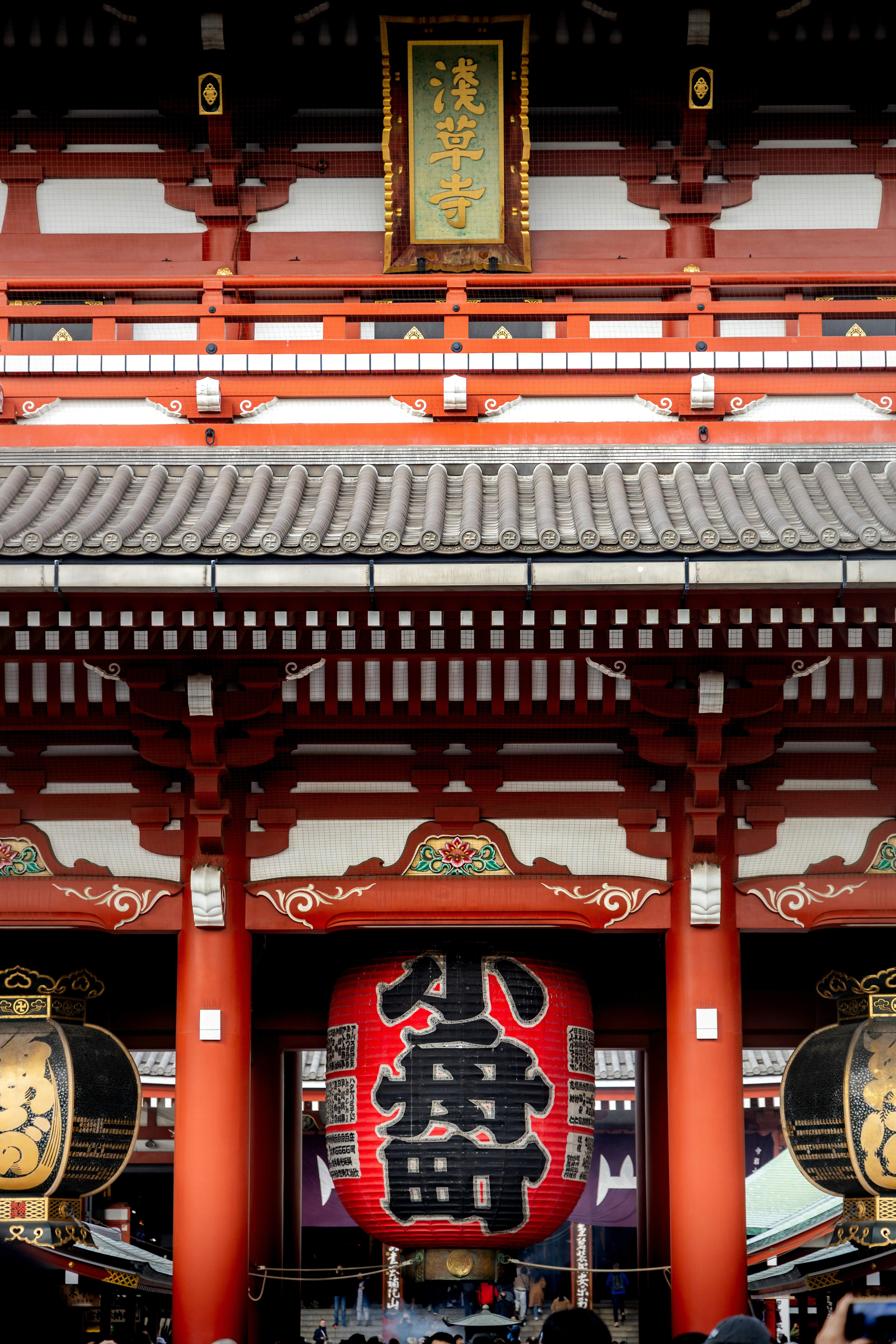 Lantern at the Gate: Central Red Beacon Framing a Temple's Symmetry