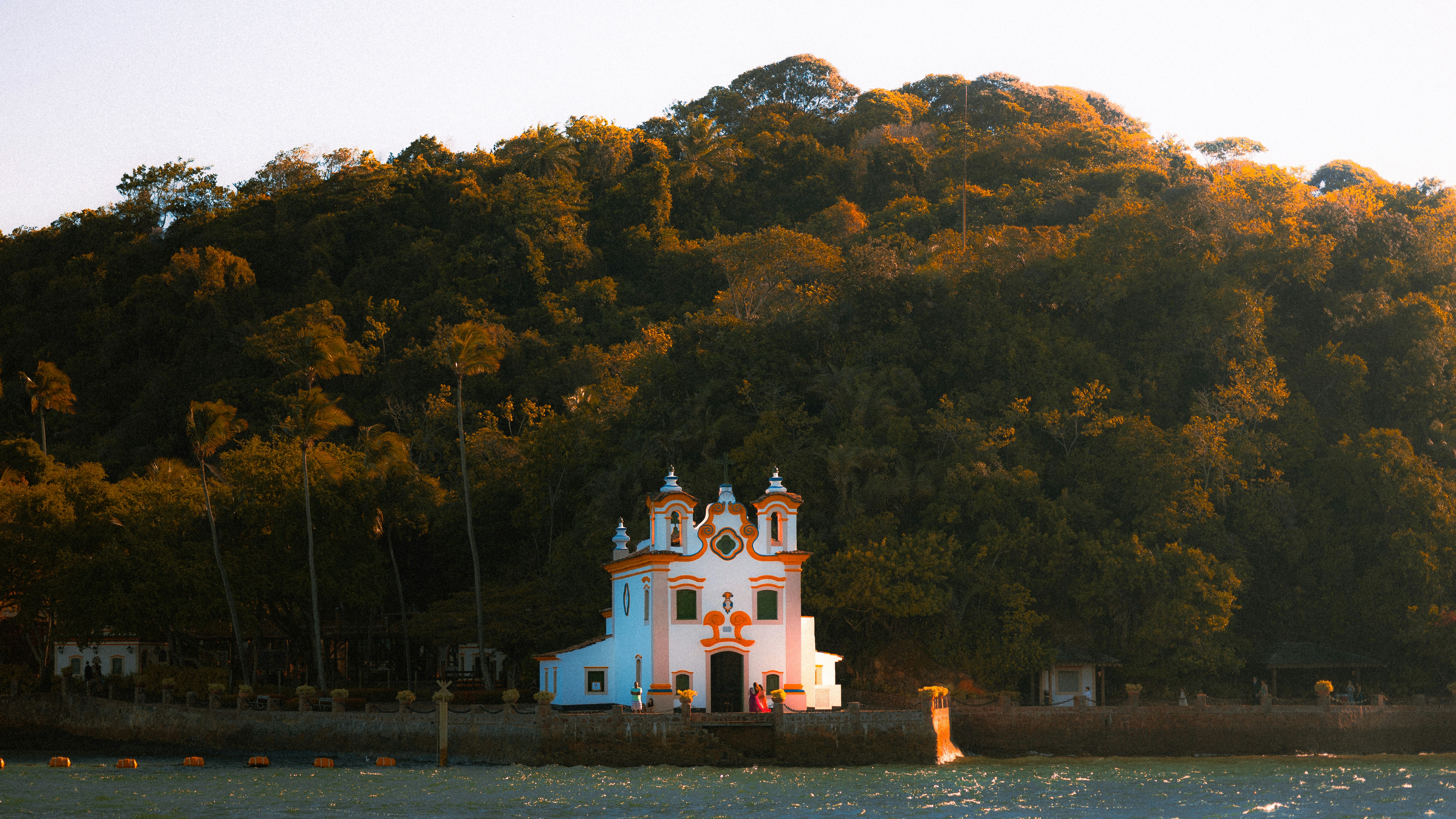 Autumn Light over the Riverside Chapel
