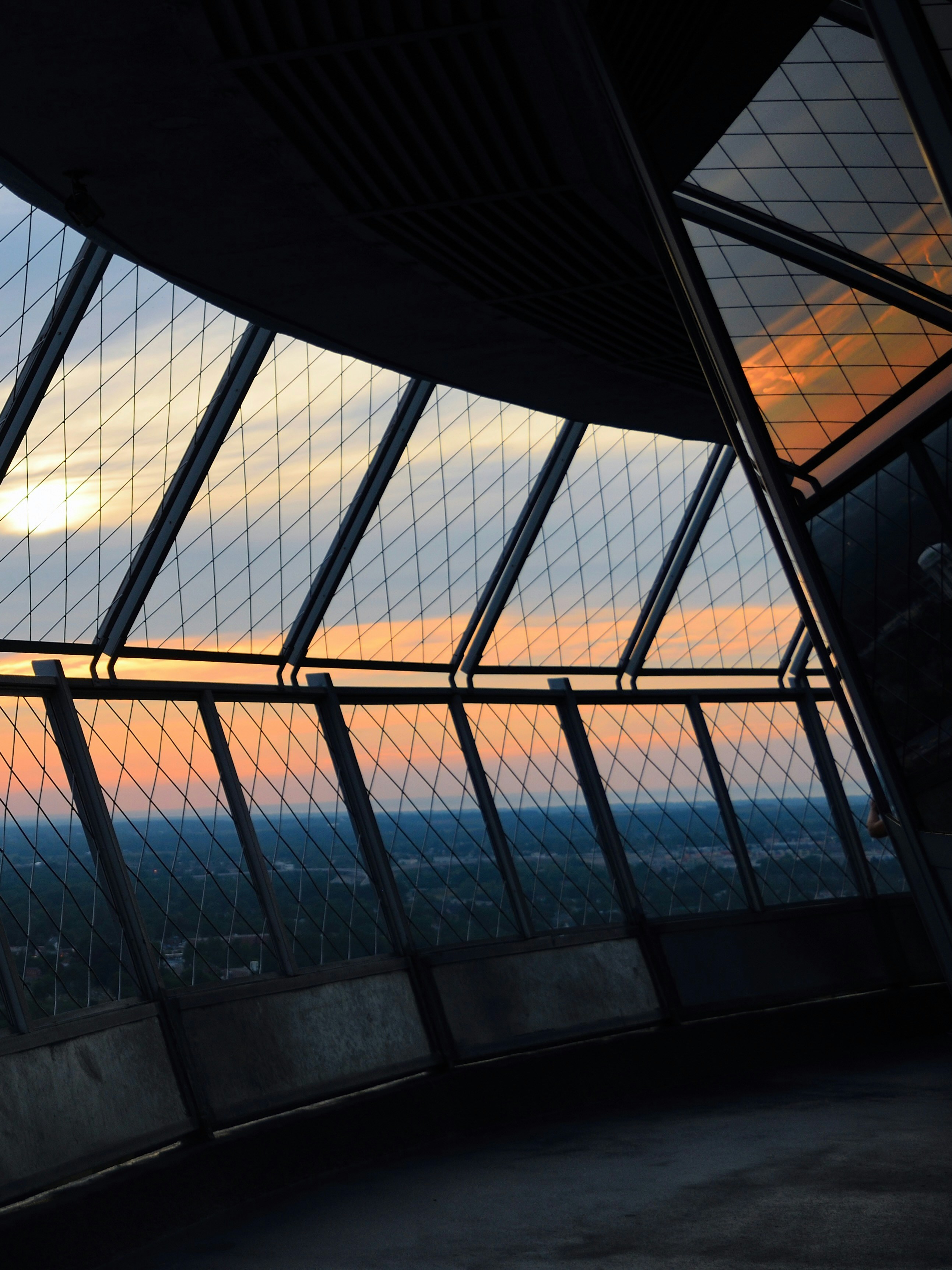 Horizon Slices Through the Angled Glass Atrium