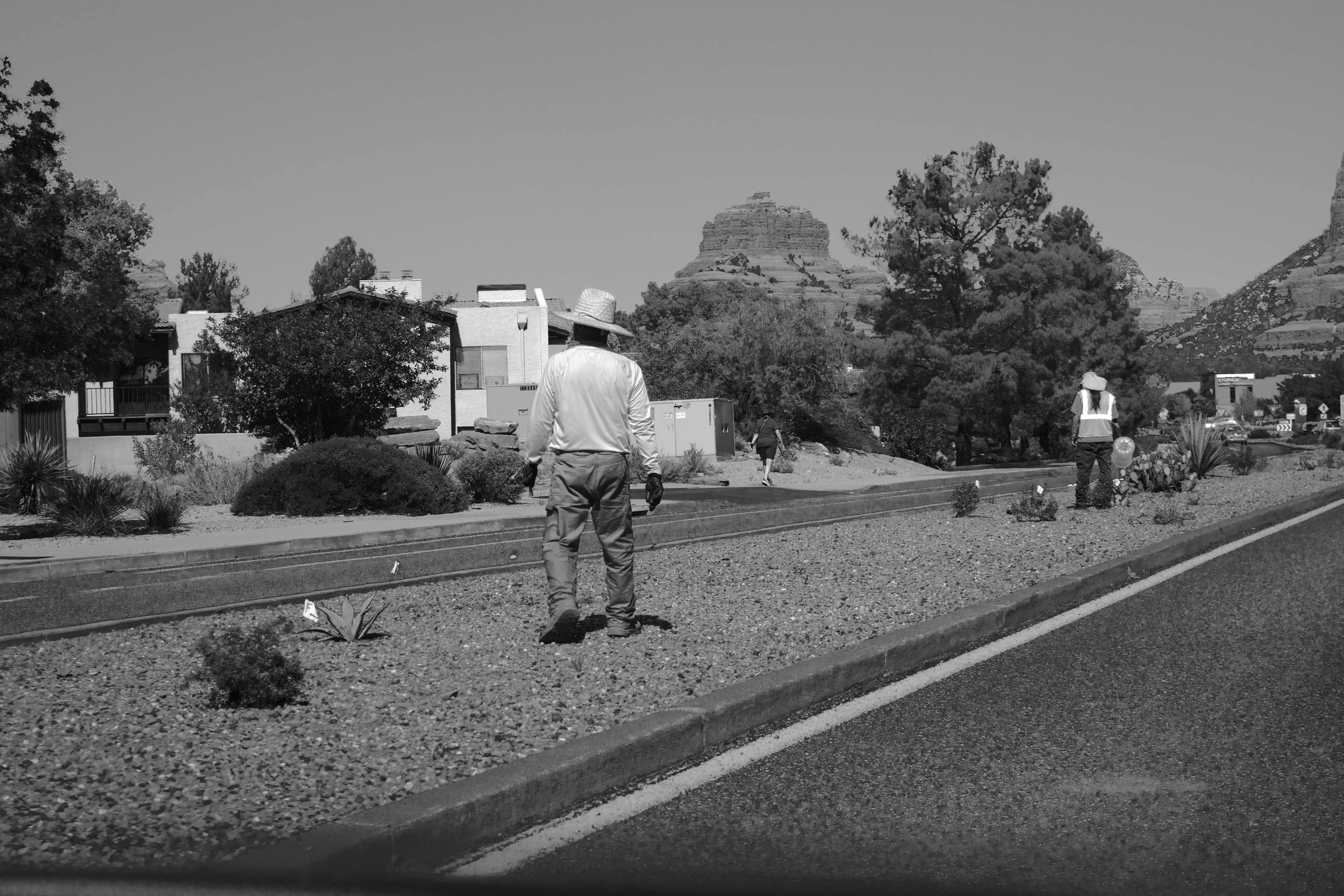 Lone Hat on the Gravel: A Quiet Roadside Moment
