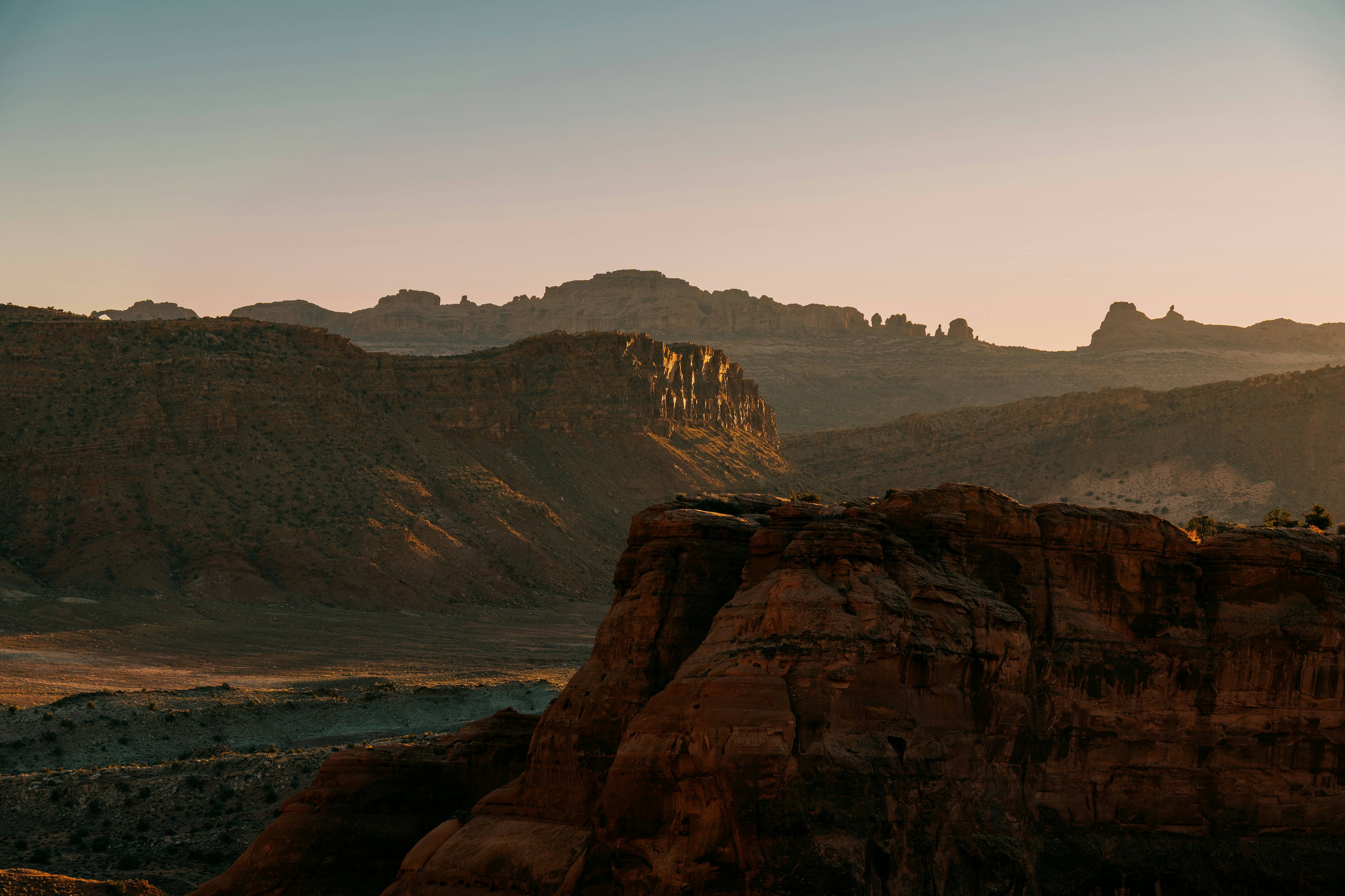 Dusk Over the Desert's Layered Cliffs