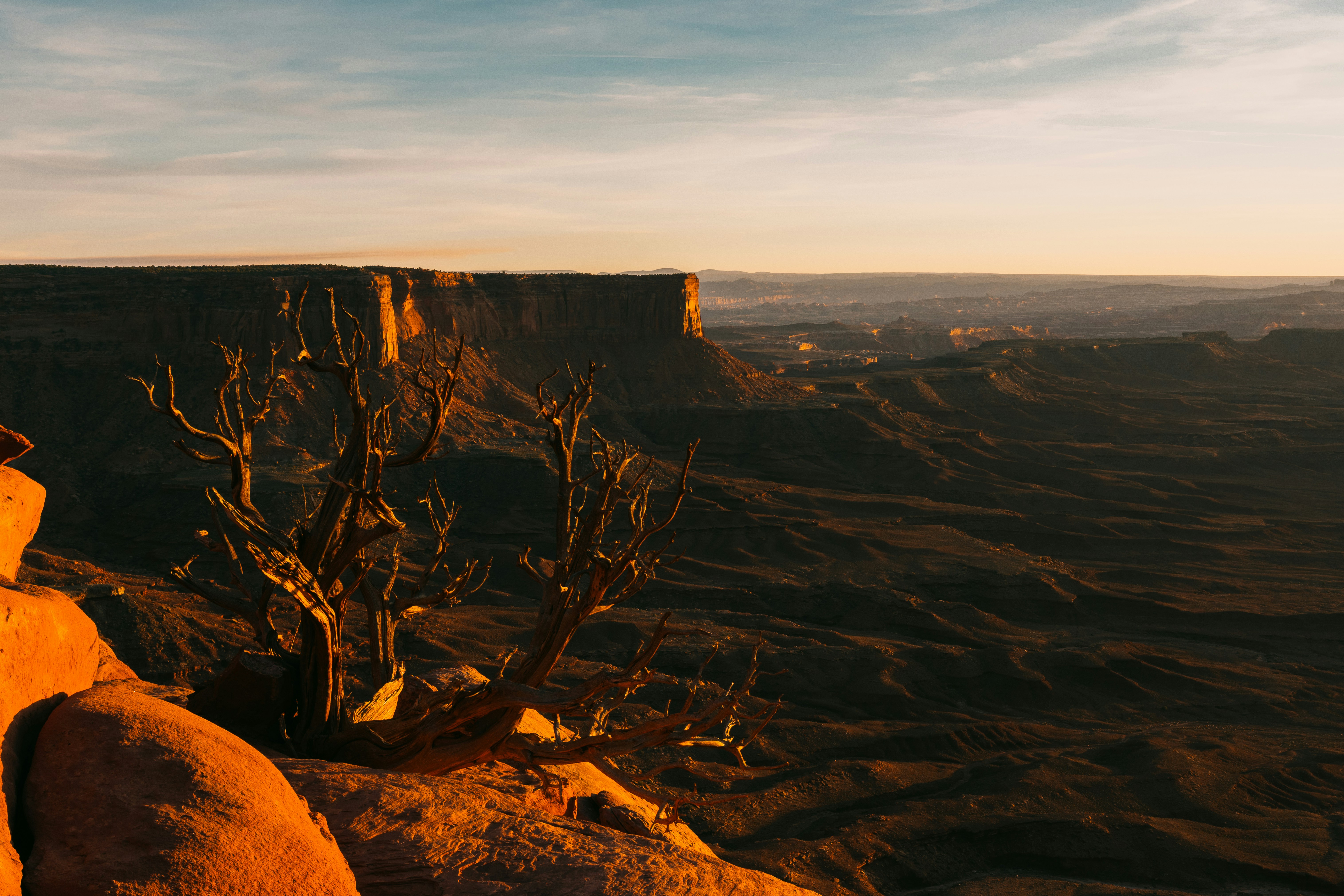 Sunset on the Rim: Firelit Cliffs Over a Quiet Canyon
