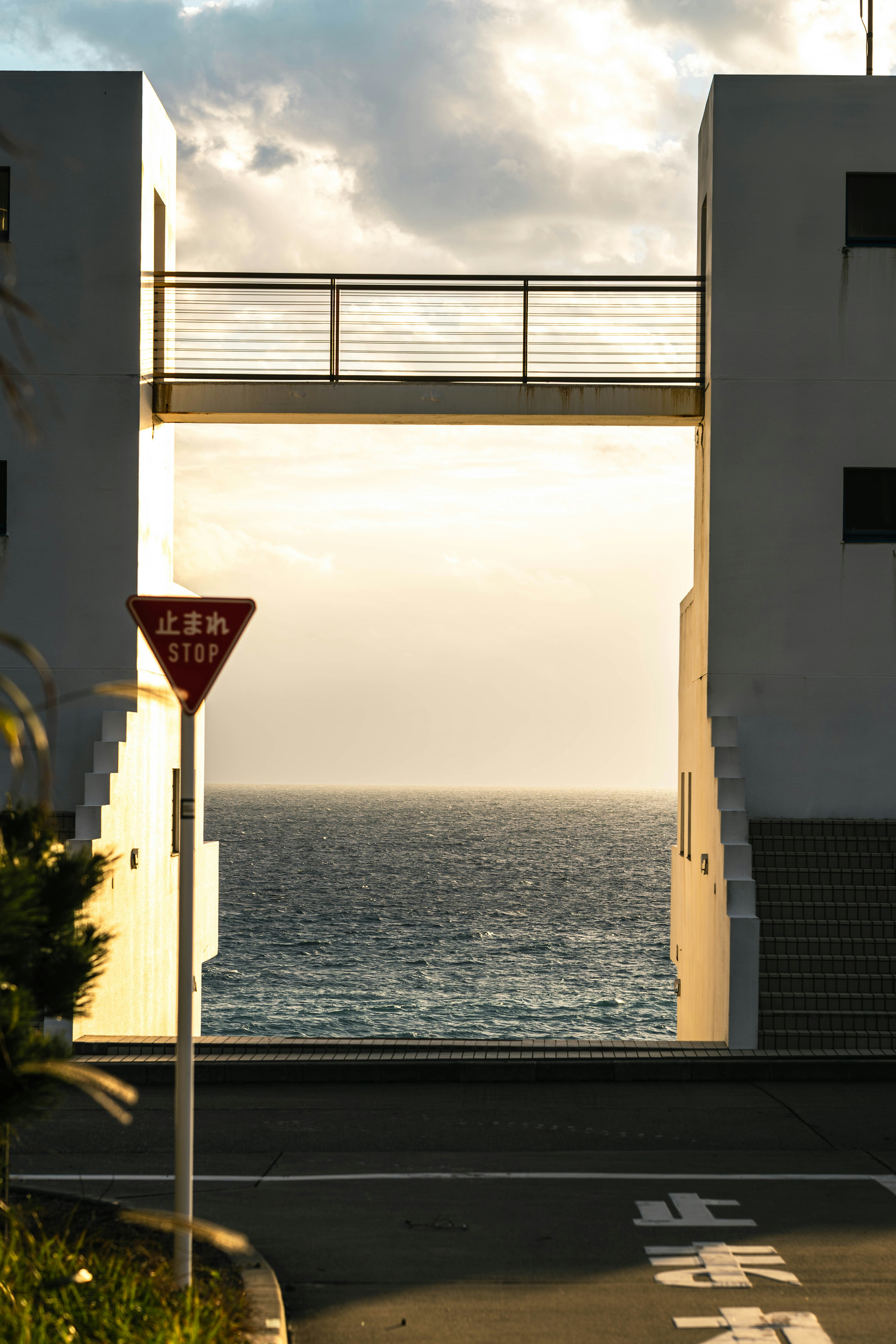 Framed Sea View: Sunset Through a Minimal Coastal Corridor