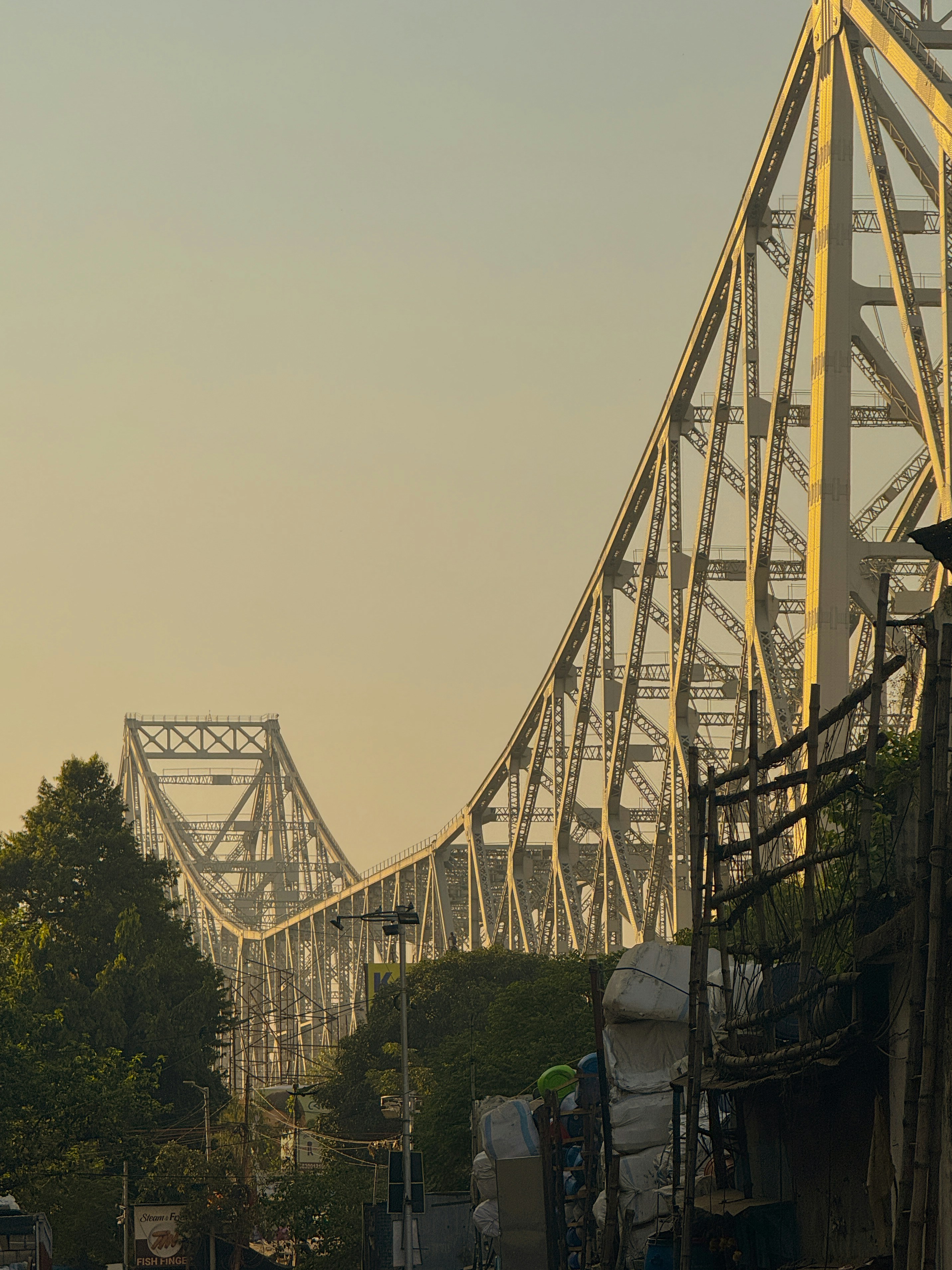 Dusk Trussscape: A City Bridge Bathed in Golden Hour