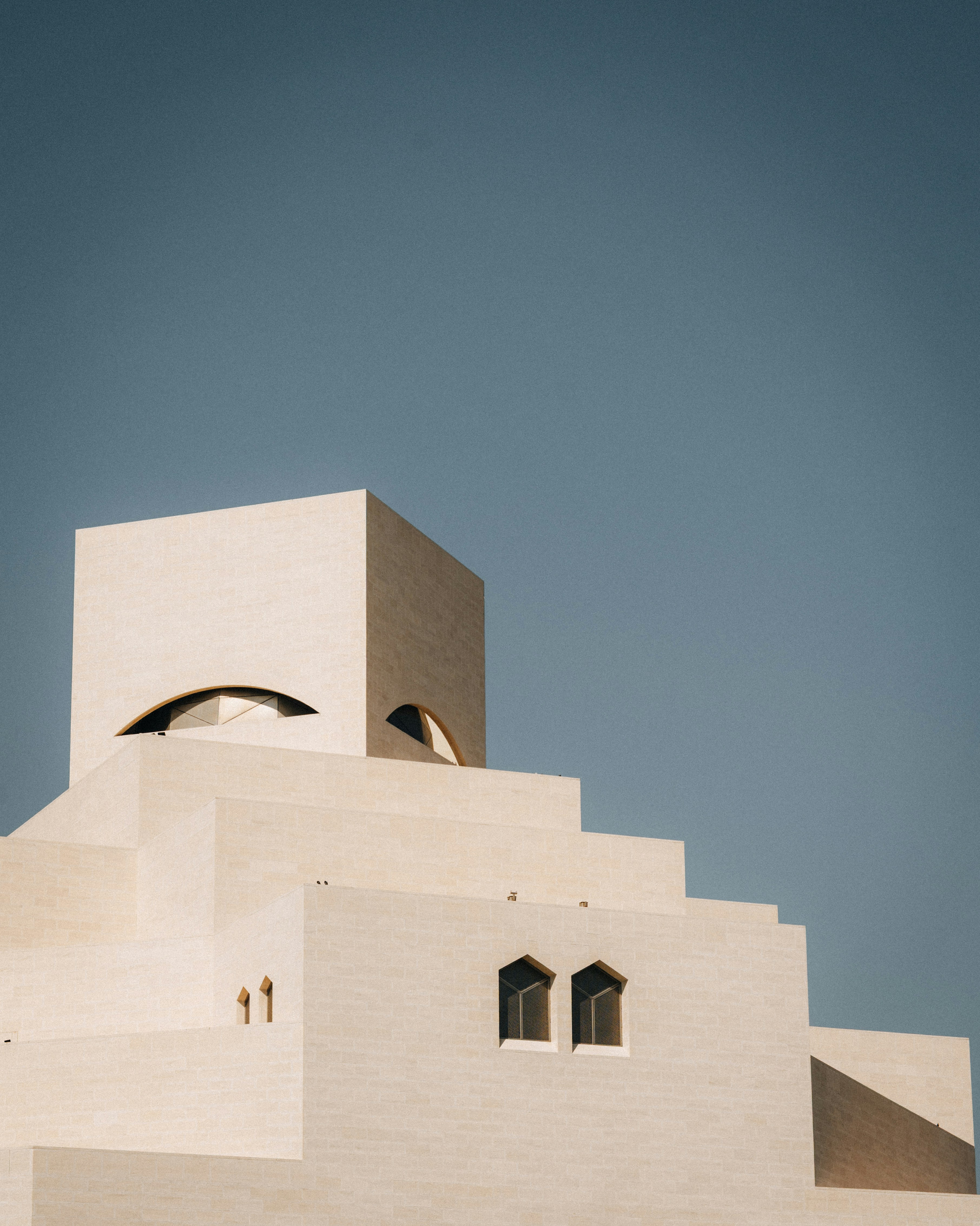 Soft geometry rising against clear sky