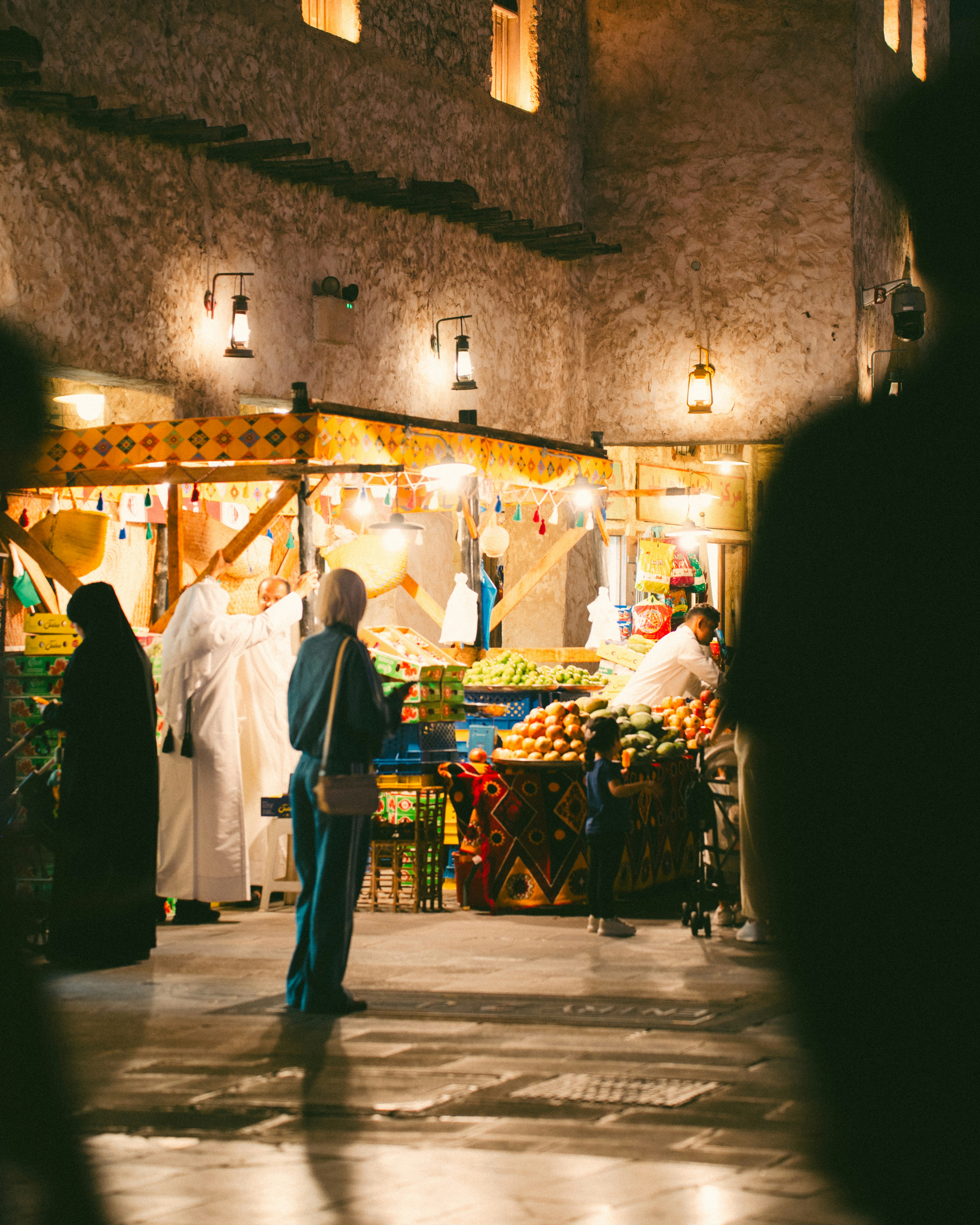 A busy market glowing with warm evening light
