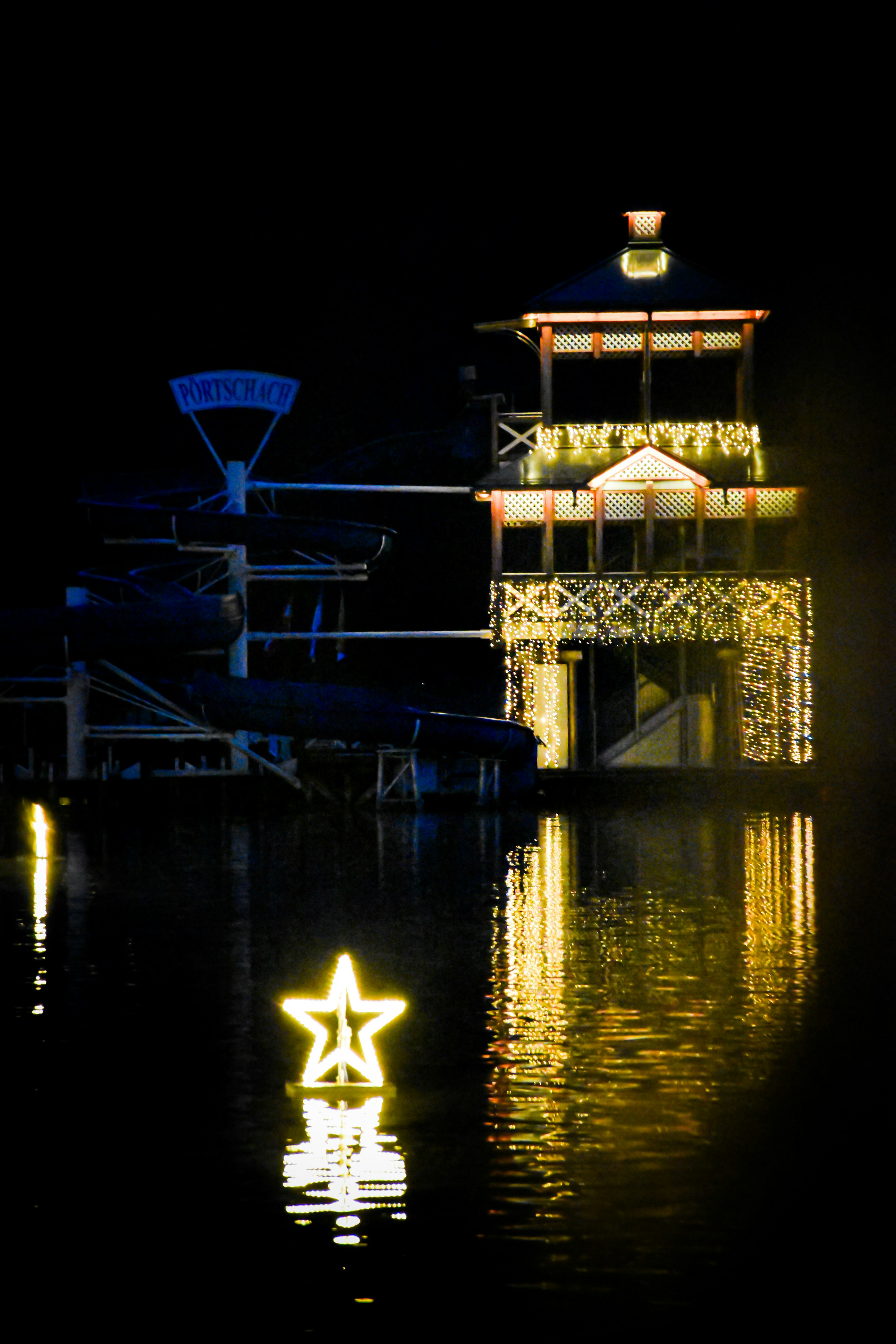 Holiday Glow Tower: Lanterns Draped Over a Quiet Marina