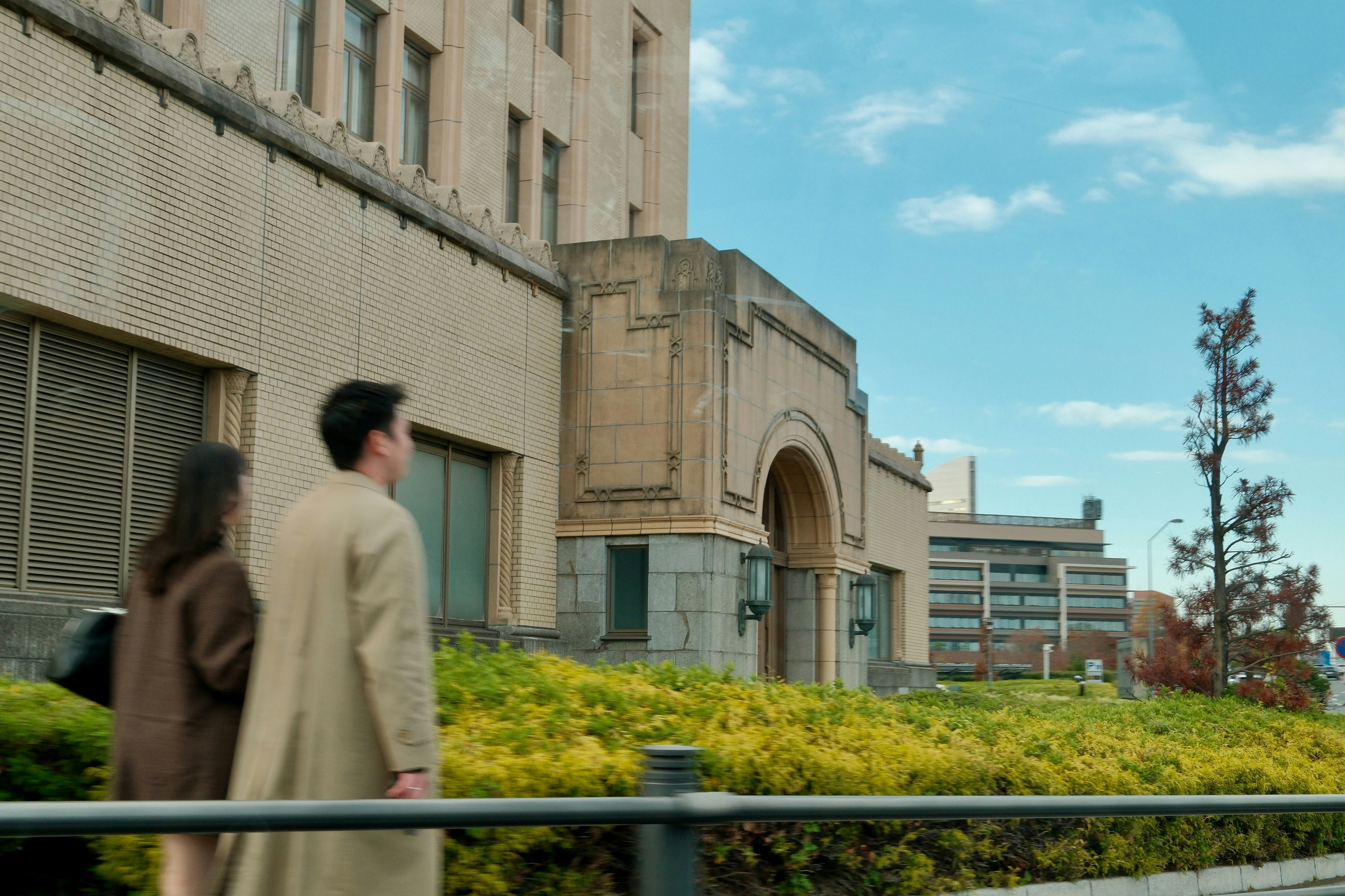 Archway Approach: A Quiet Moment by the Campus Gate