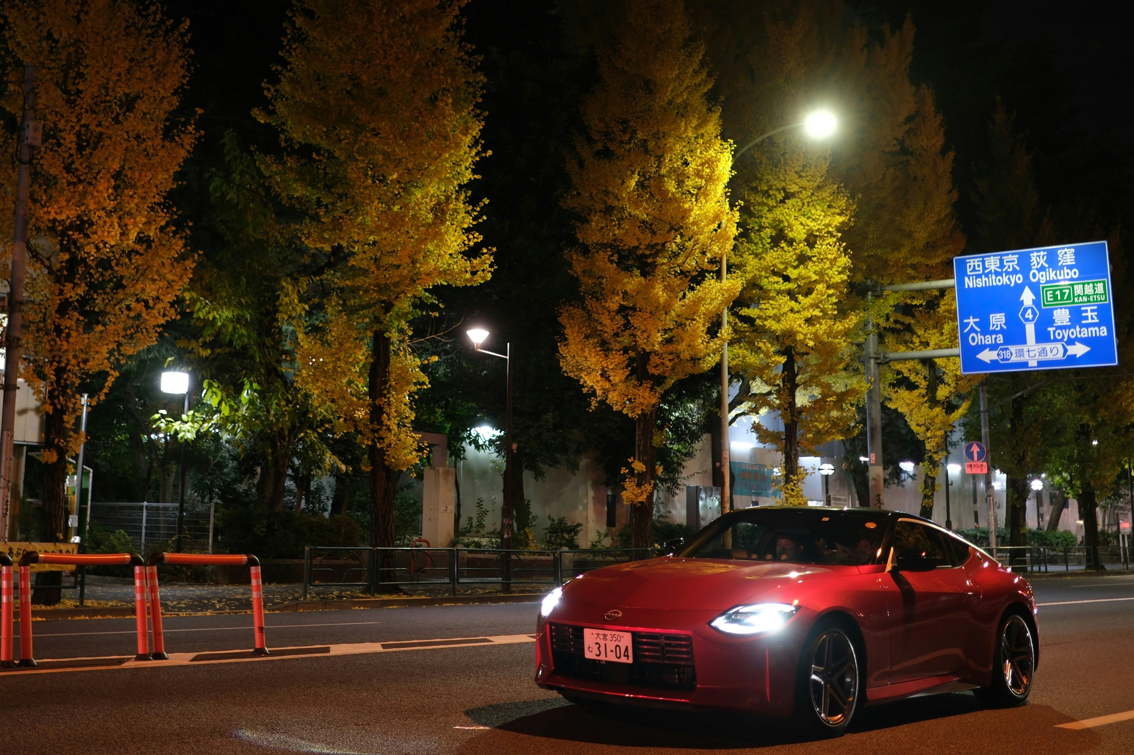 Crimson Coupe Under Neon Night: Autumn Street Pulse