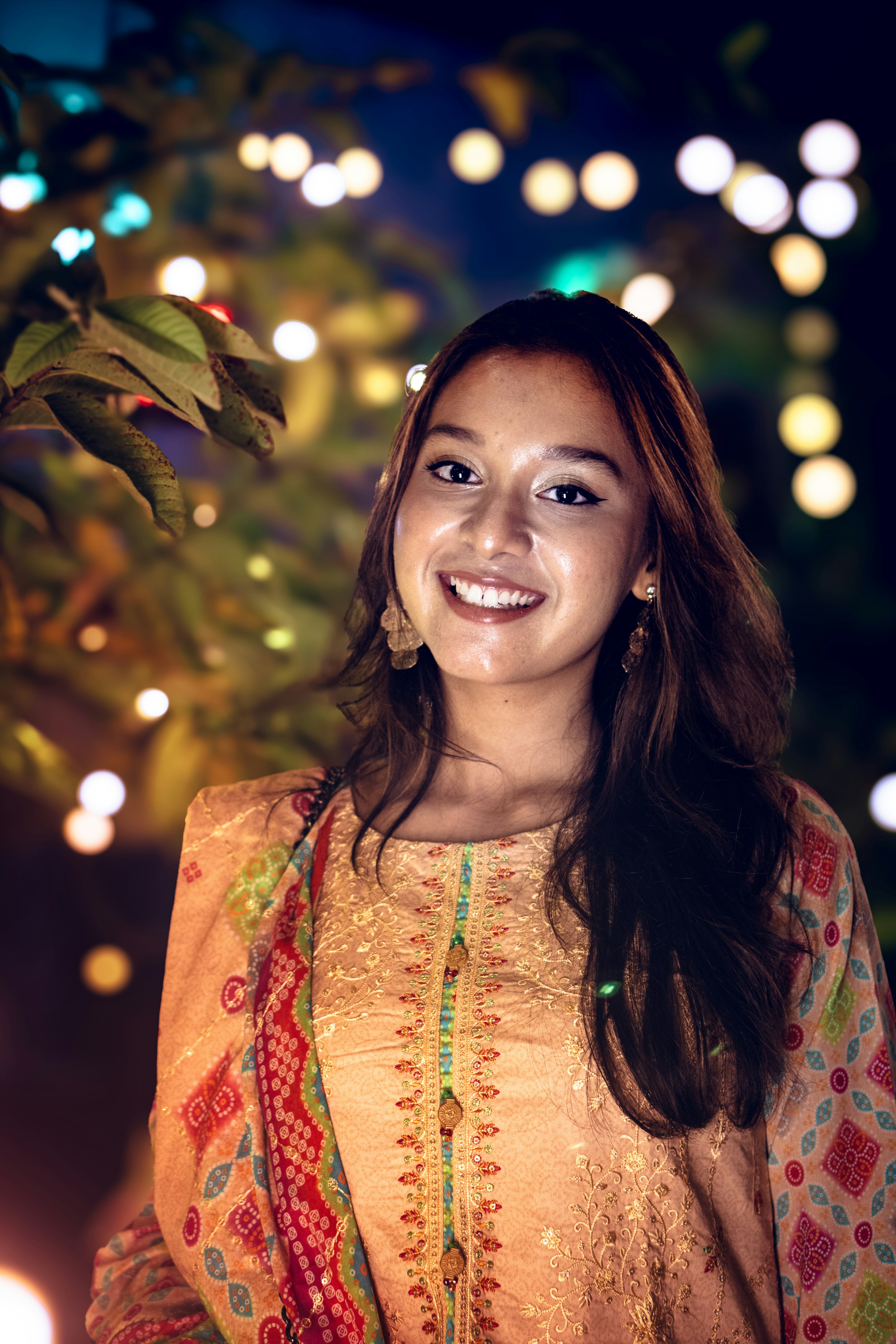 Soft-Glint Portrait Under Warm Night Lights