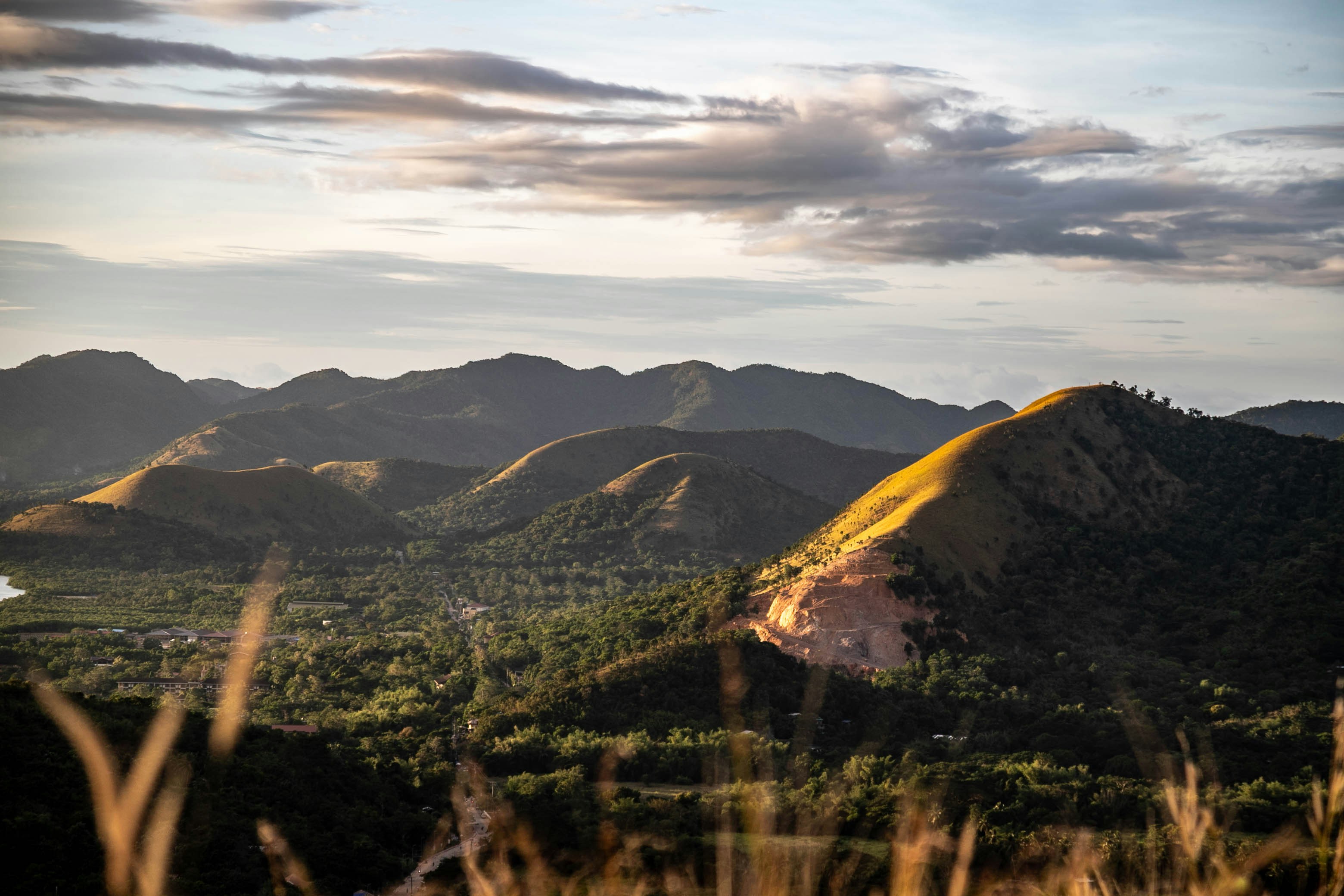 Golden Ridge at Dusk Over Rolling Hills