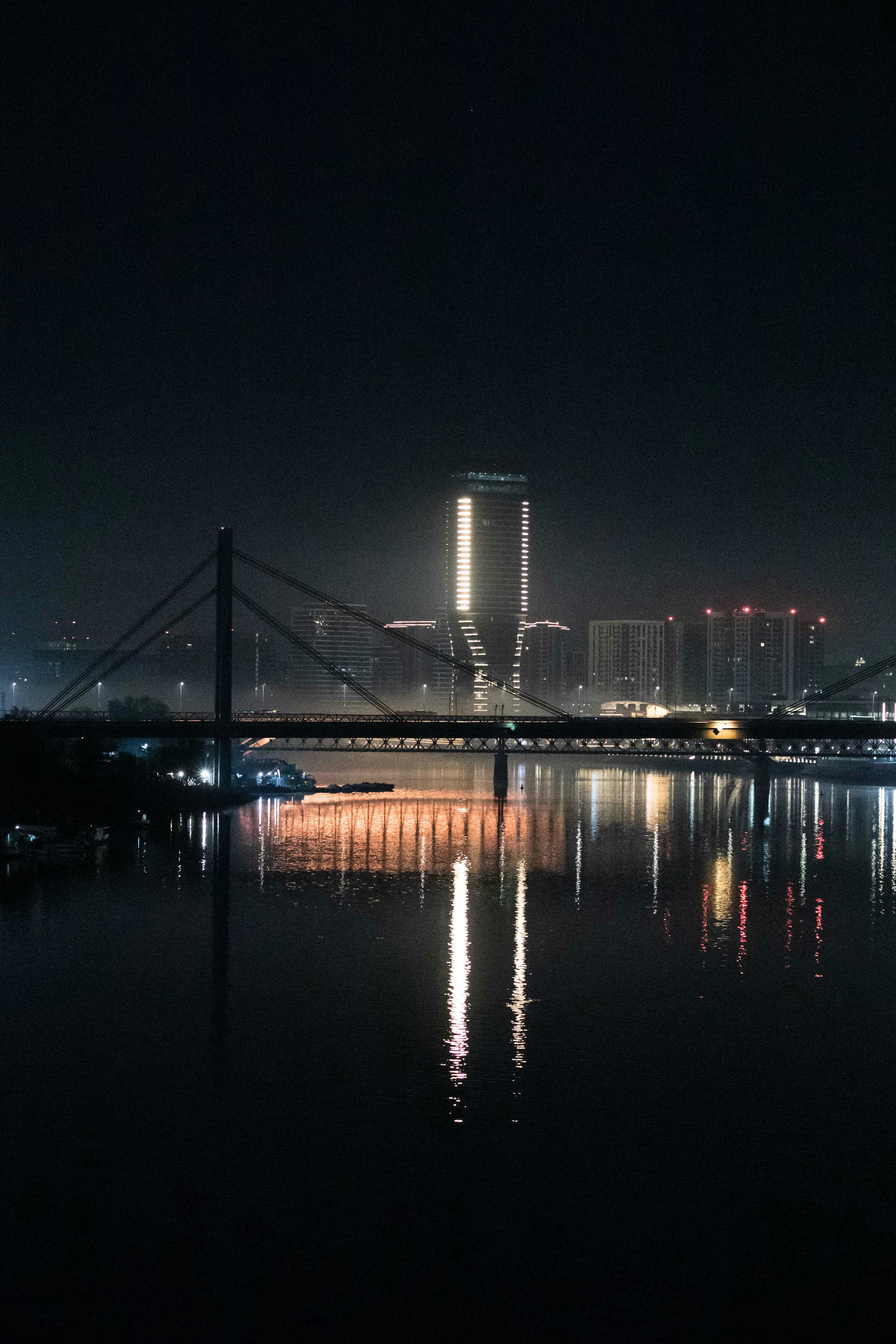 Neon Skyline Reflected: A Quiet Night Over the River