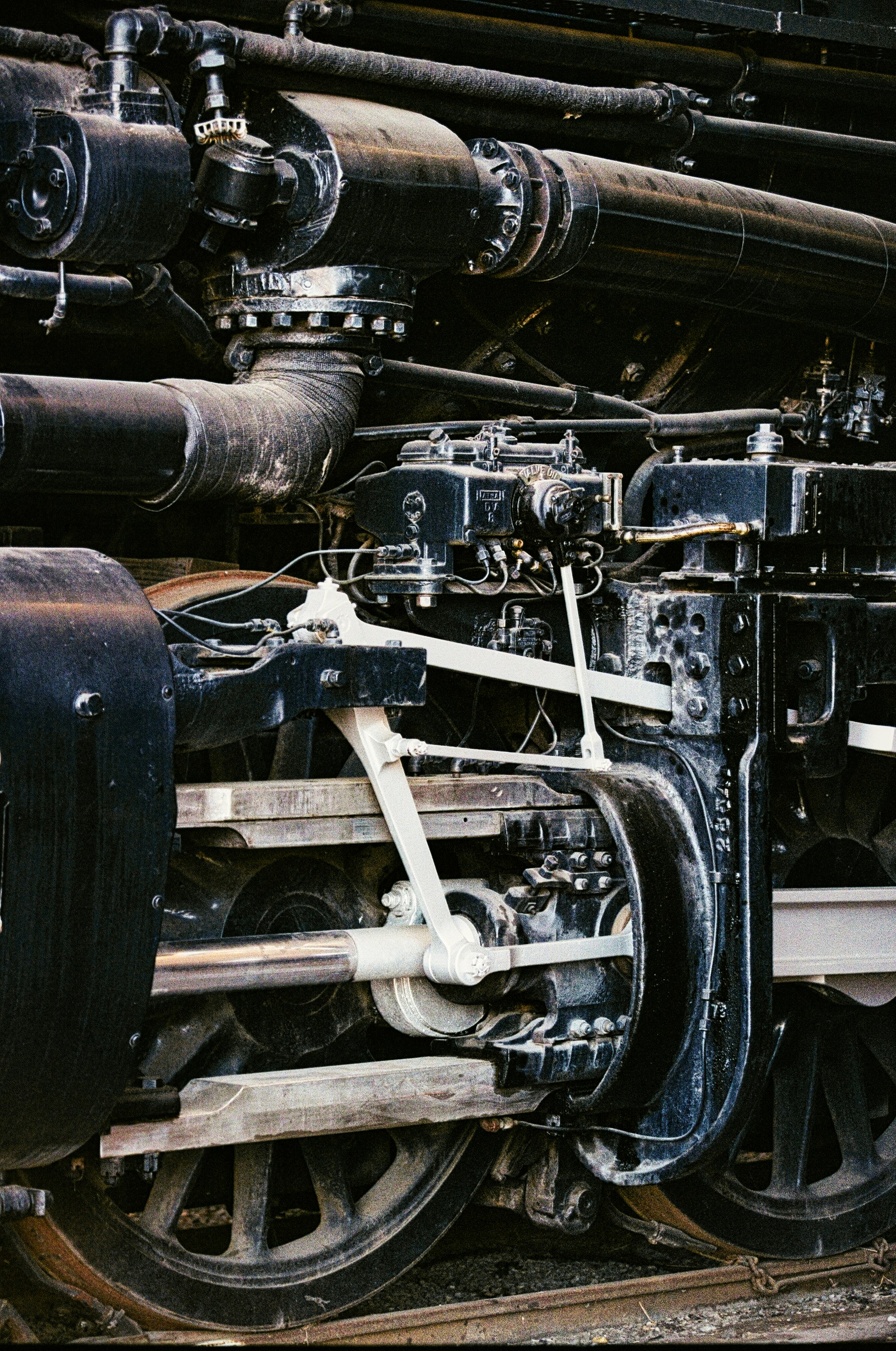 Close-up of steam locomotive engine mechanics and wheels. photo – Free ...